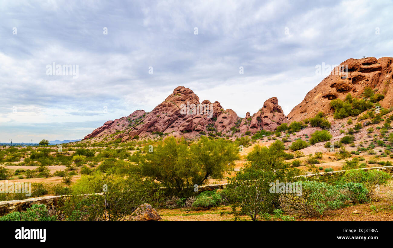 The red sandstone buttes of Papago Park, with its many caves and ...