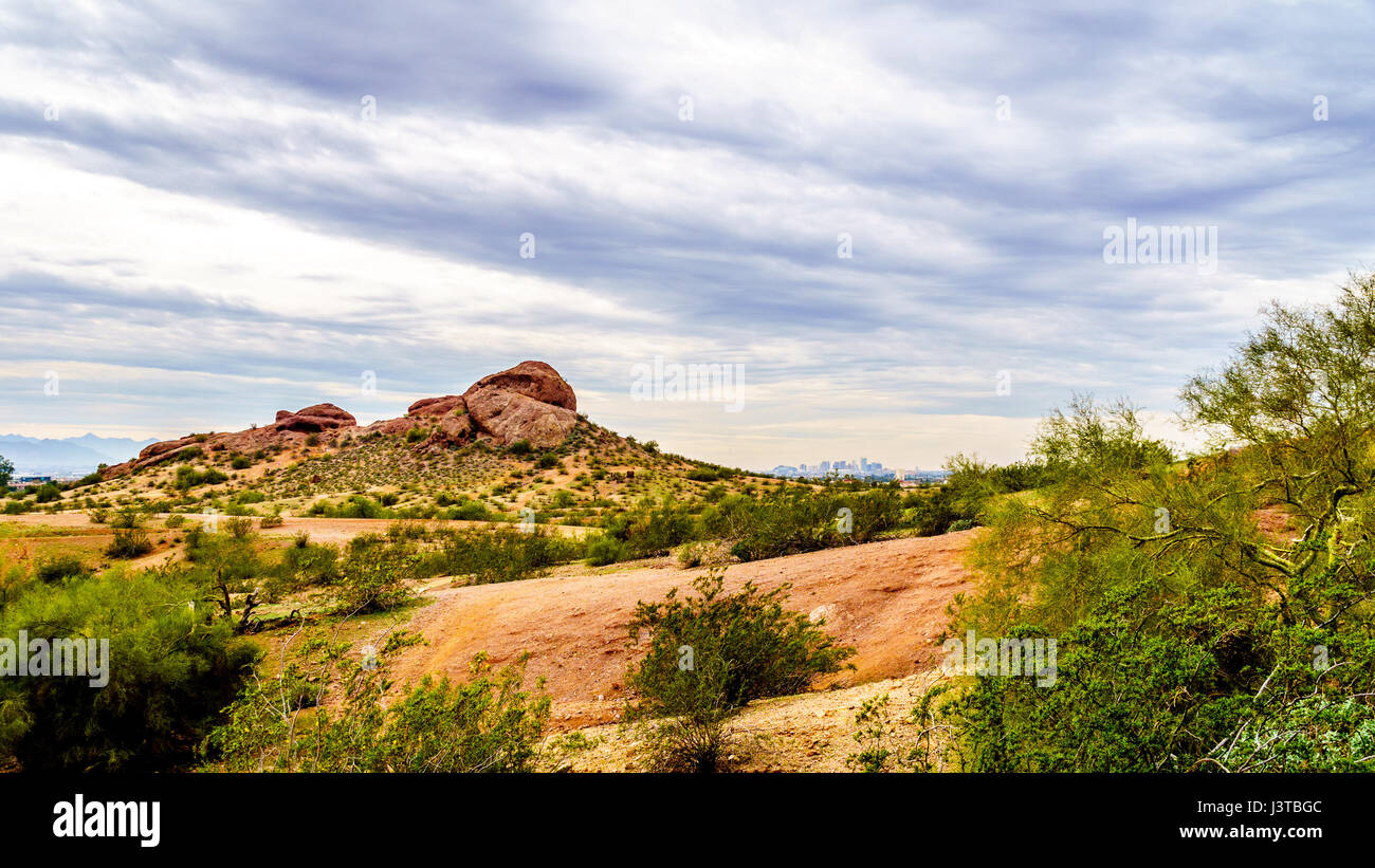 The red sandstone buttes of Papago Park, with its many caves and ...