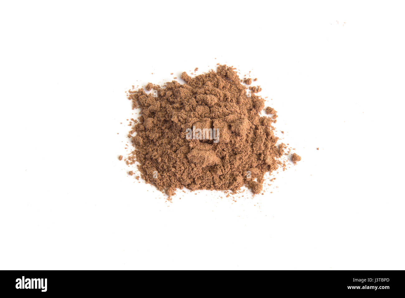 Pile cocoa powder isolated on white background Stock Photo - Alamy