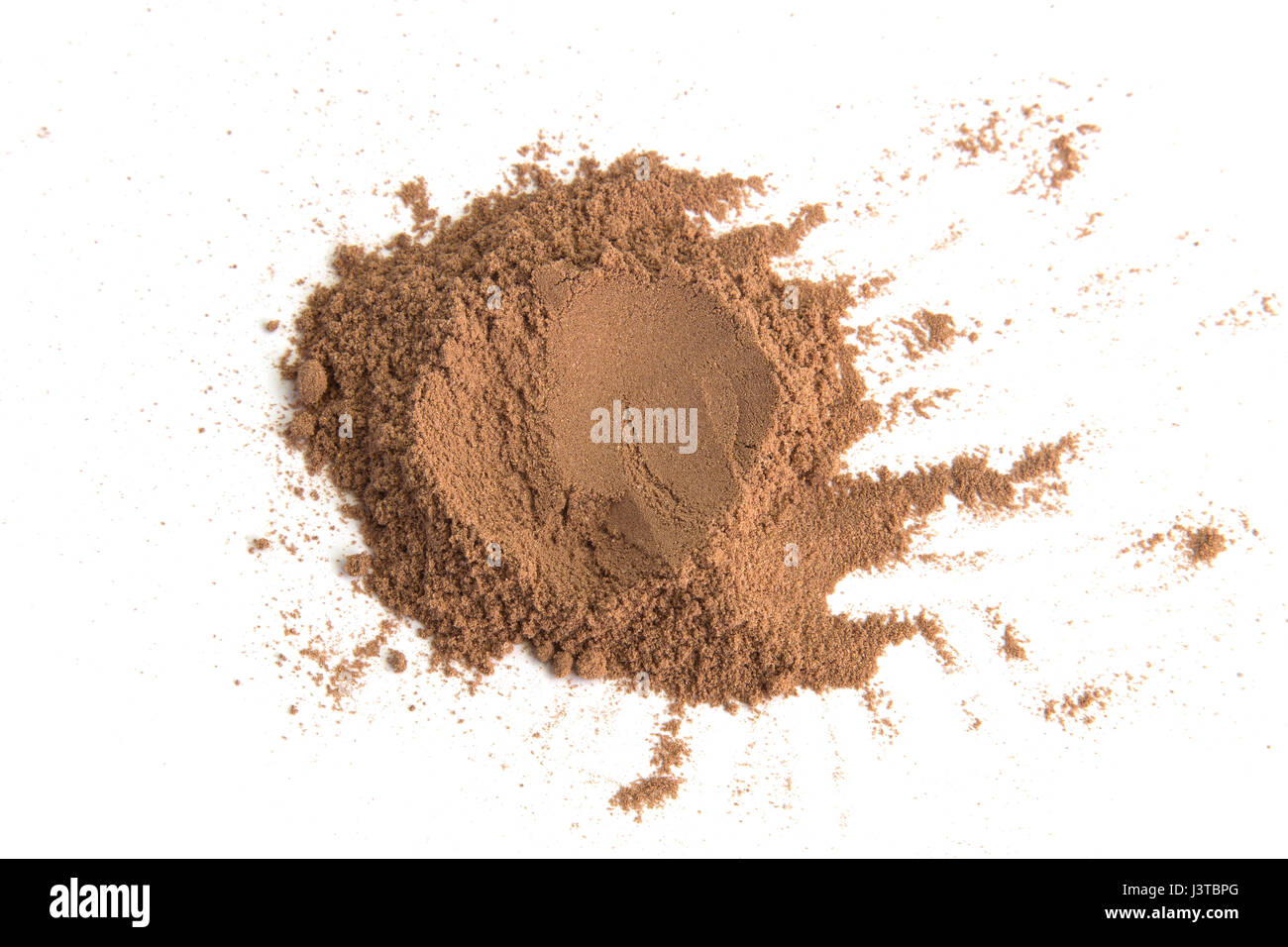 Pile cocoa powder isolated on white background Stock Photo - Alamy