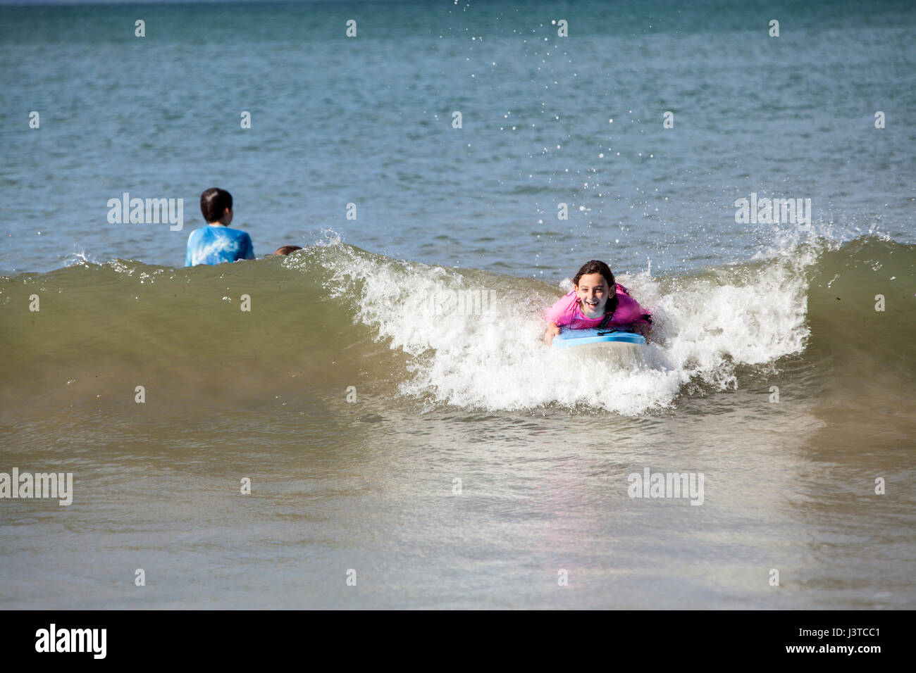Surfing in Vincentia, NSW, Australia Stock Photo - Alamy