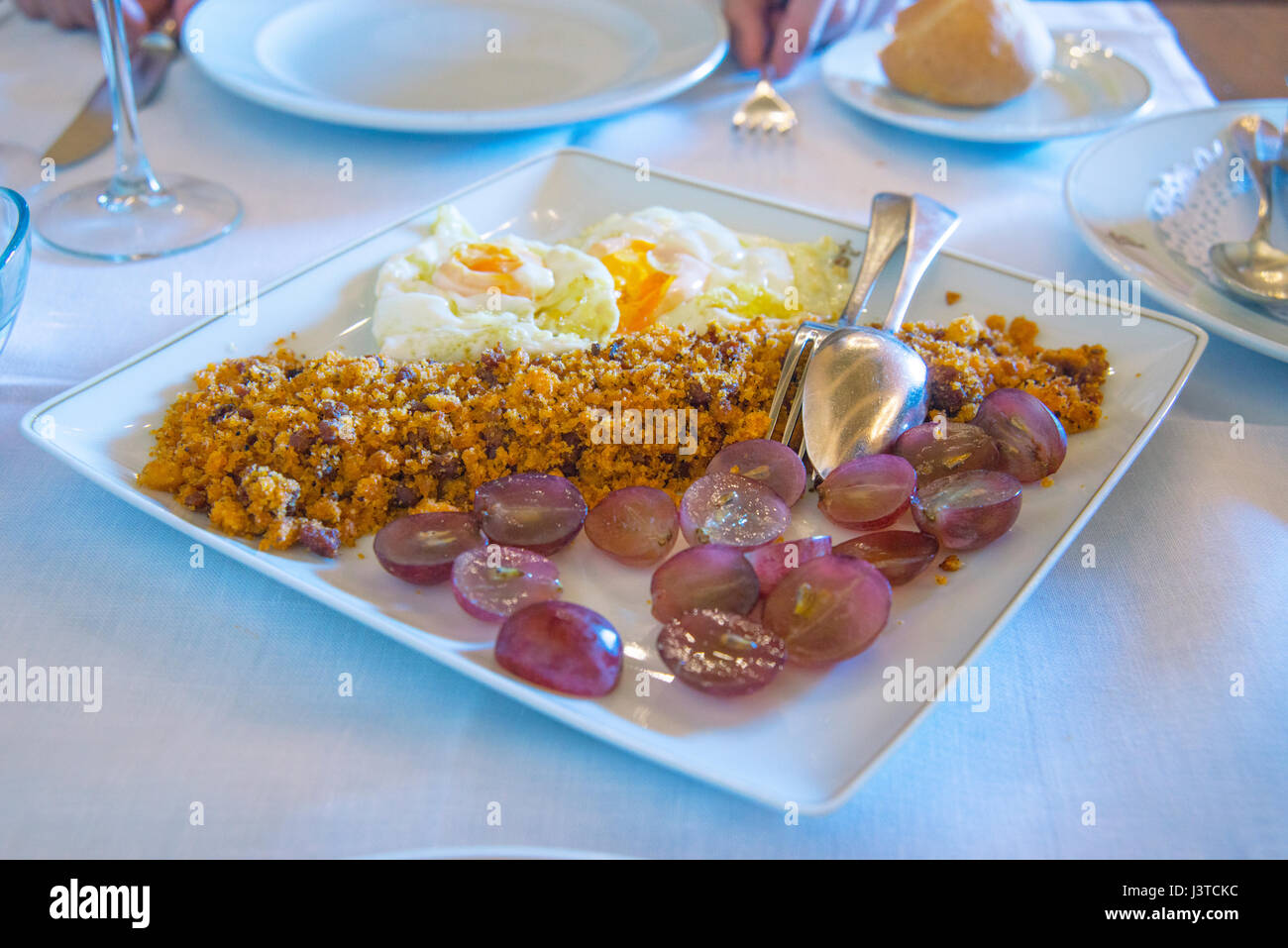 Migas manchegas, traditional Spanish dish made of crumbs, fried eggs ...