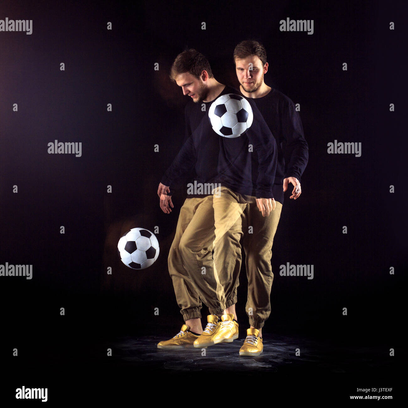 A portrait of a fan with ball on gray studio background. Freestile ...