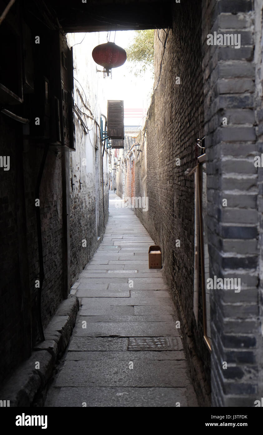 Old narrow street in Chinese water village Xitang. It is one of six ...