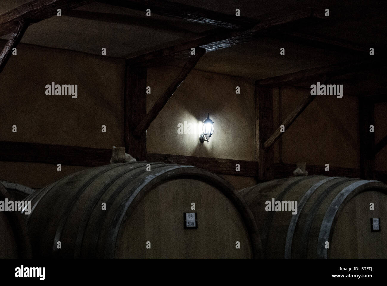Wooden barrels of aged cognac at cellar of Brandy Factory Noy of ...