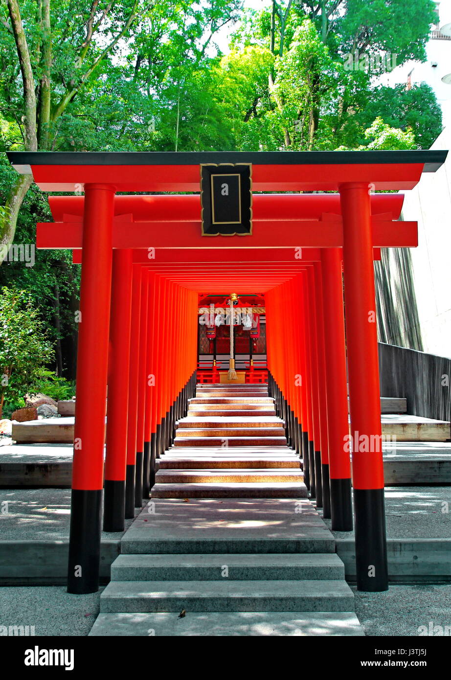 Red door facade, call Torii in Japanese, at Ikuta shrine (God of love ...