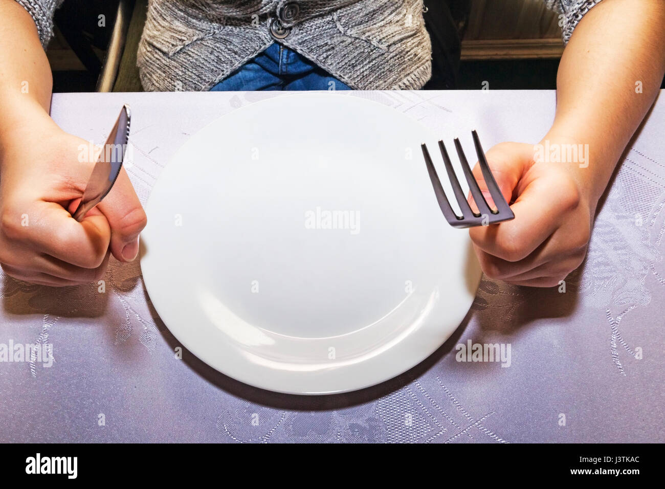 Child at restaurant is waiting for his meal Stock Photo - Alamy