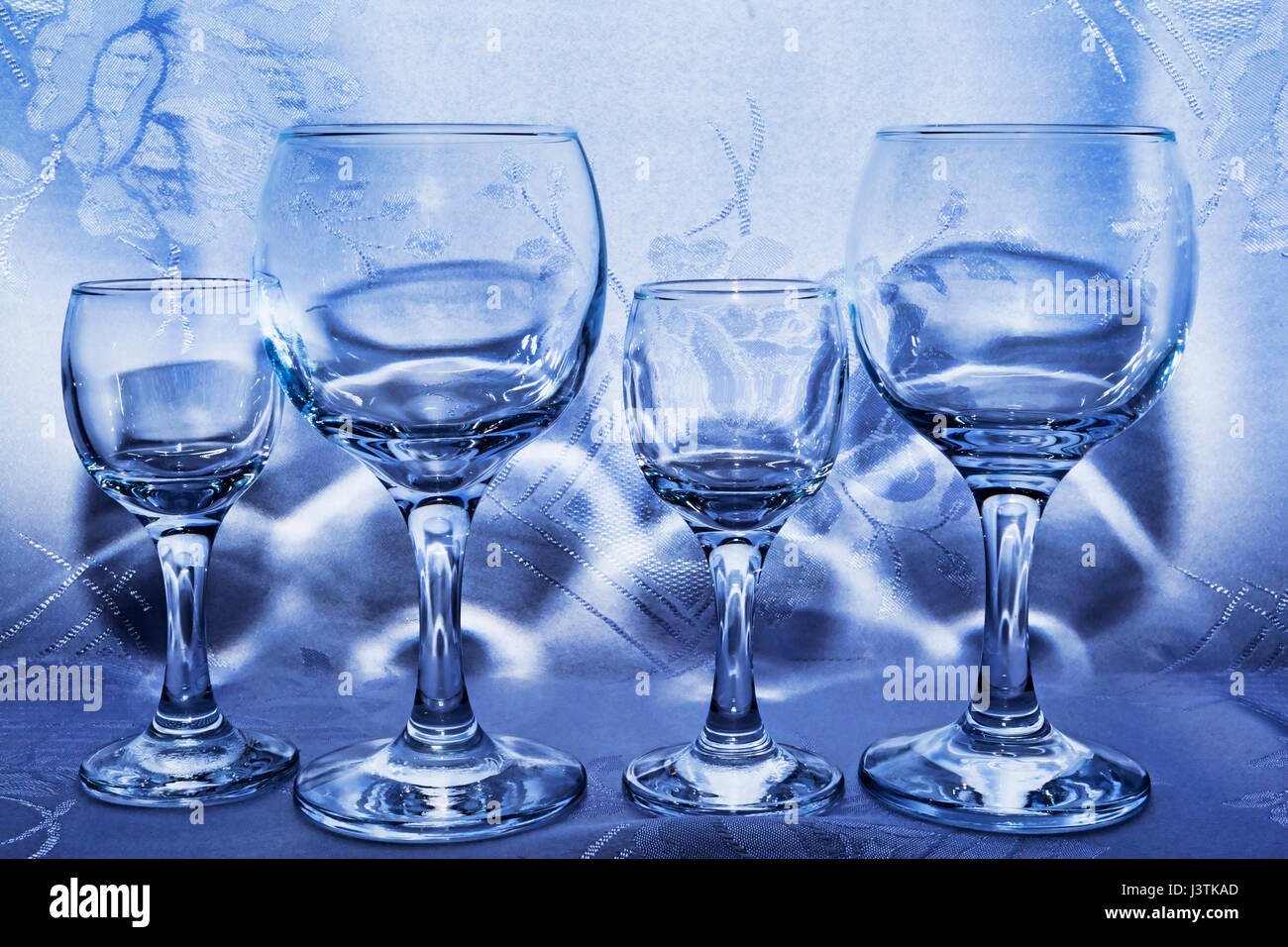 Four glasses in a shop window Stock Photo - Alamy