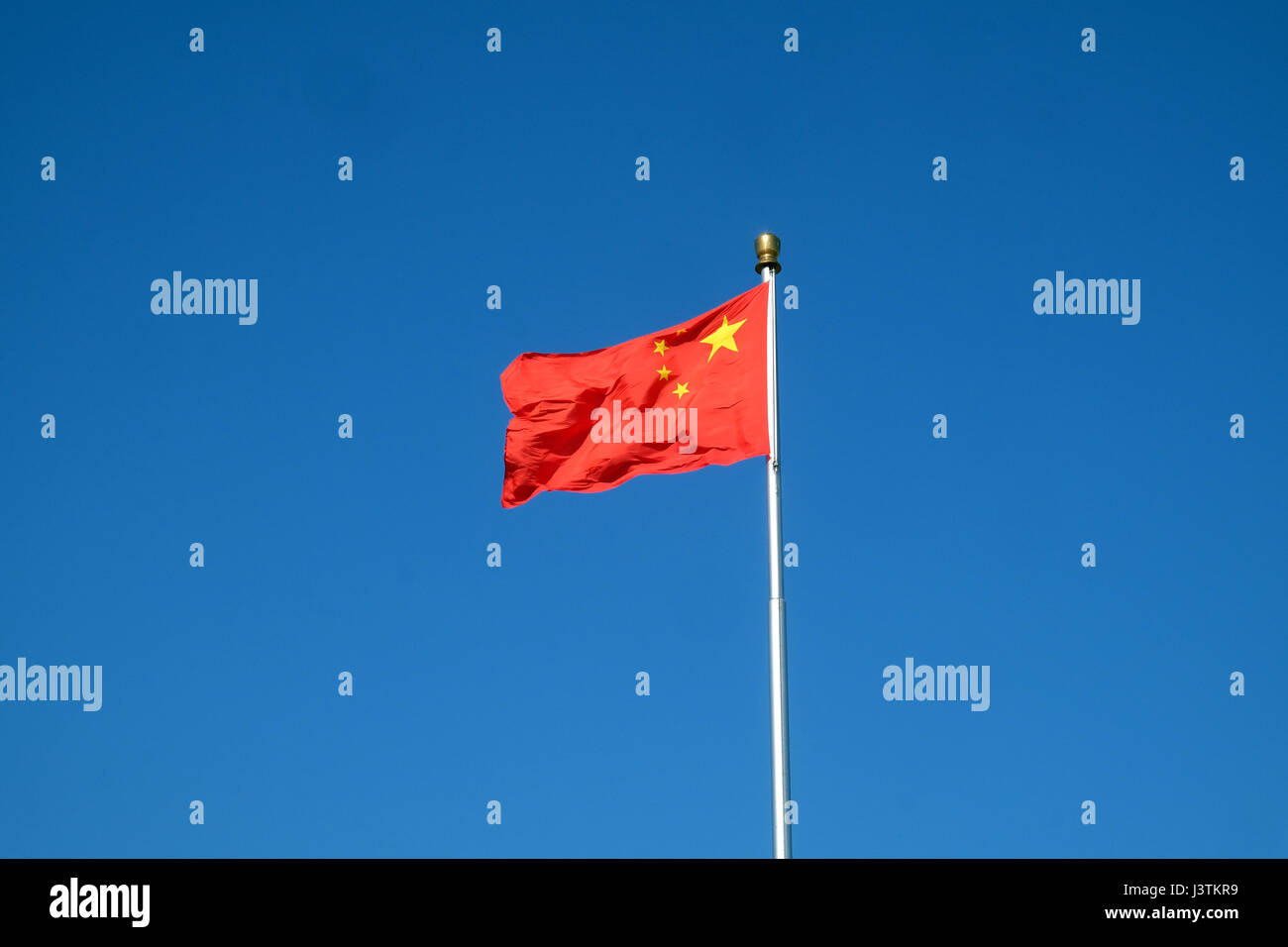 Flag of China on the mast in Tiananmen Square. It's the third largest ...