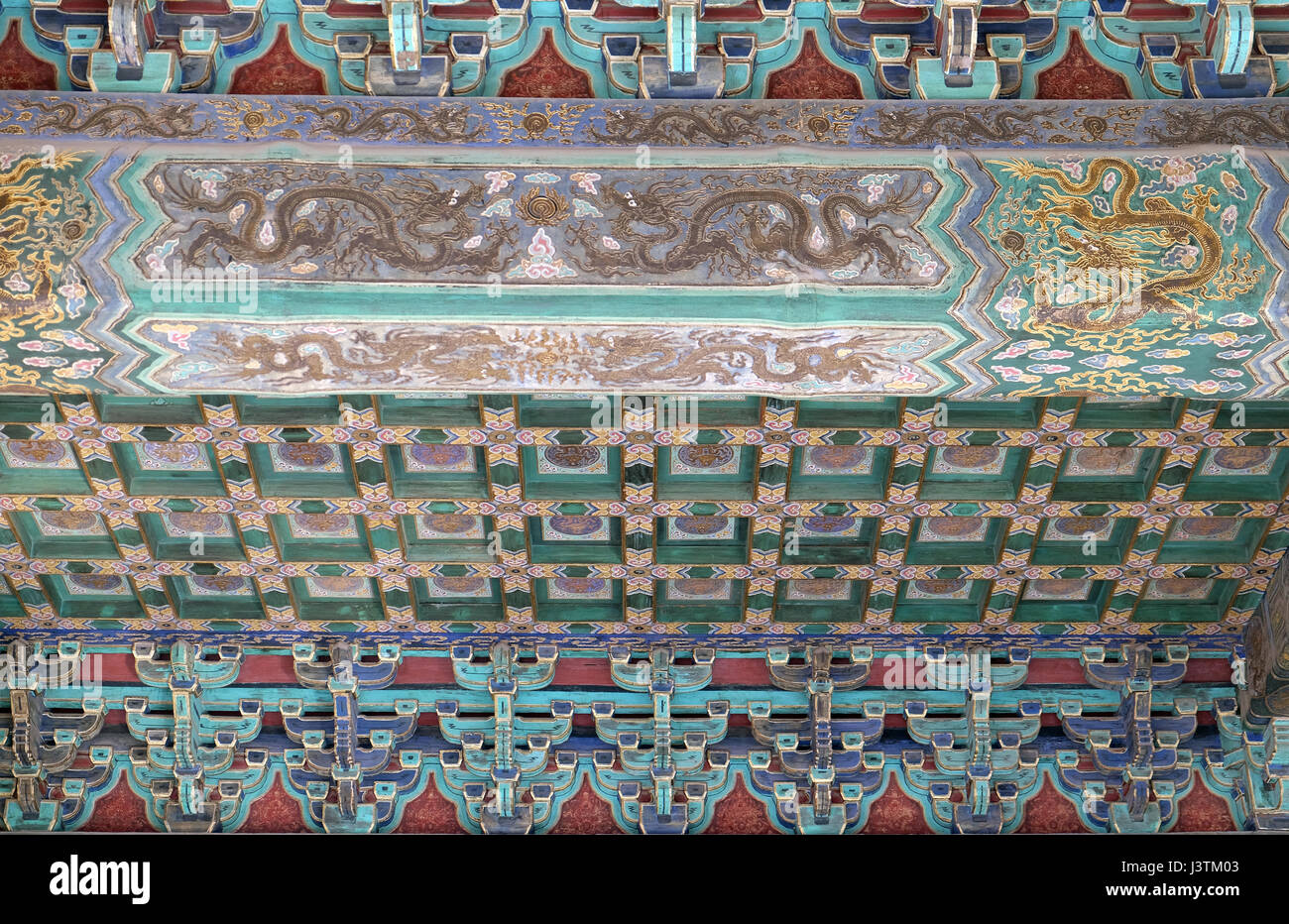 An ornate painted ceiling on a building in the Forbidden City in ...