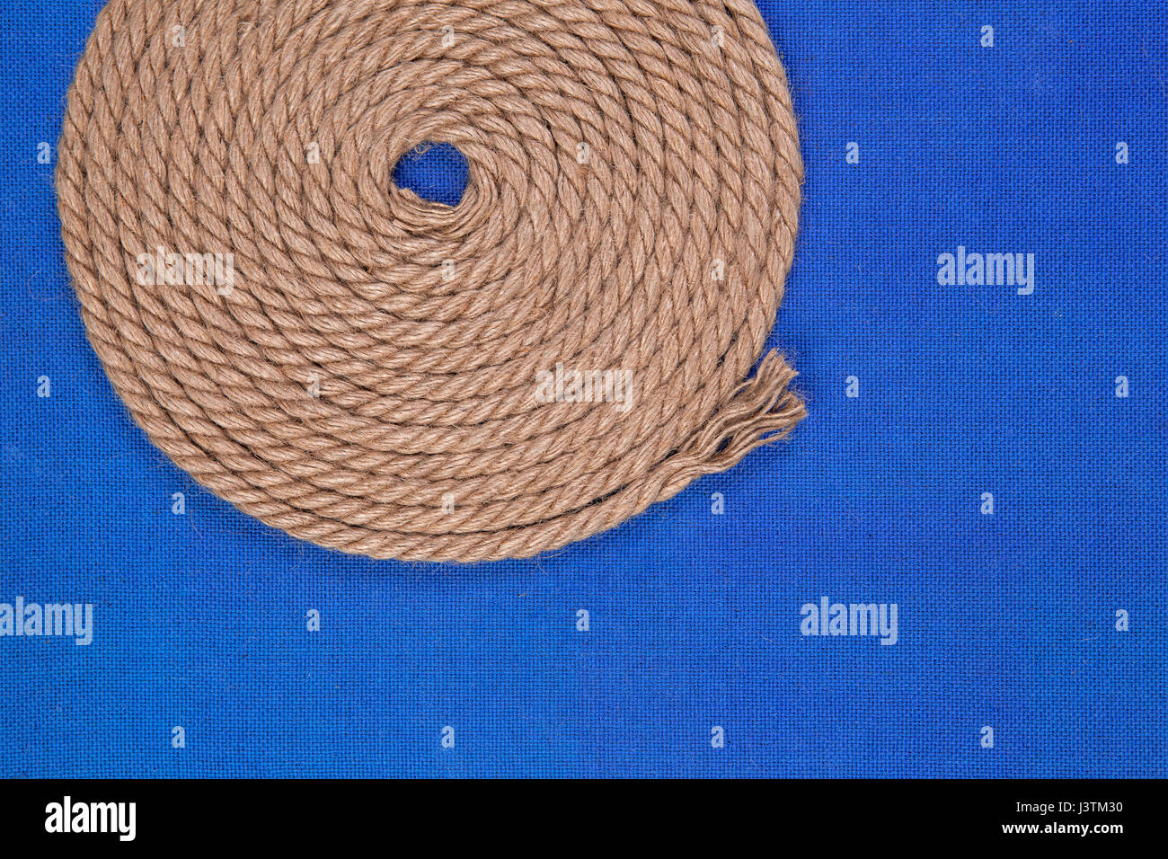 Ship rope on blue background, top view with copy space Stock Photo - Alamy