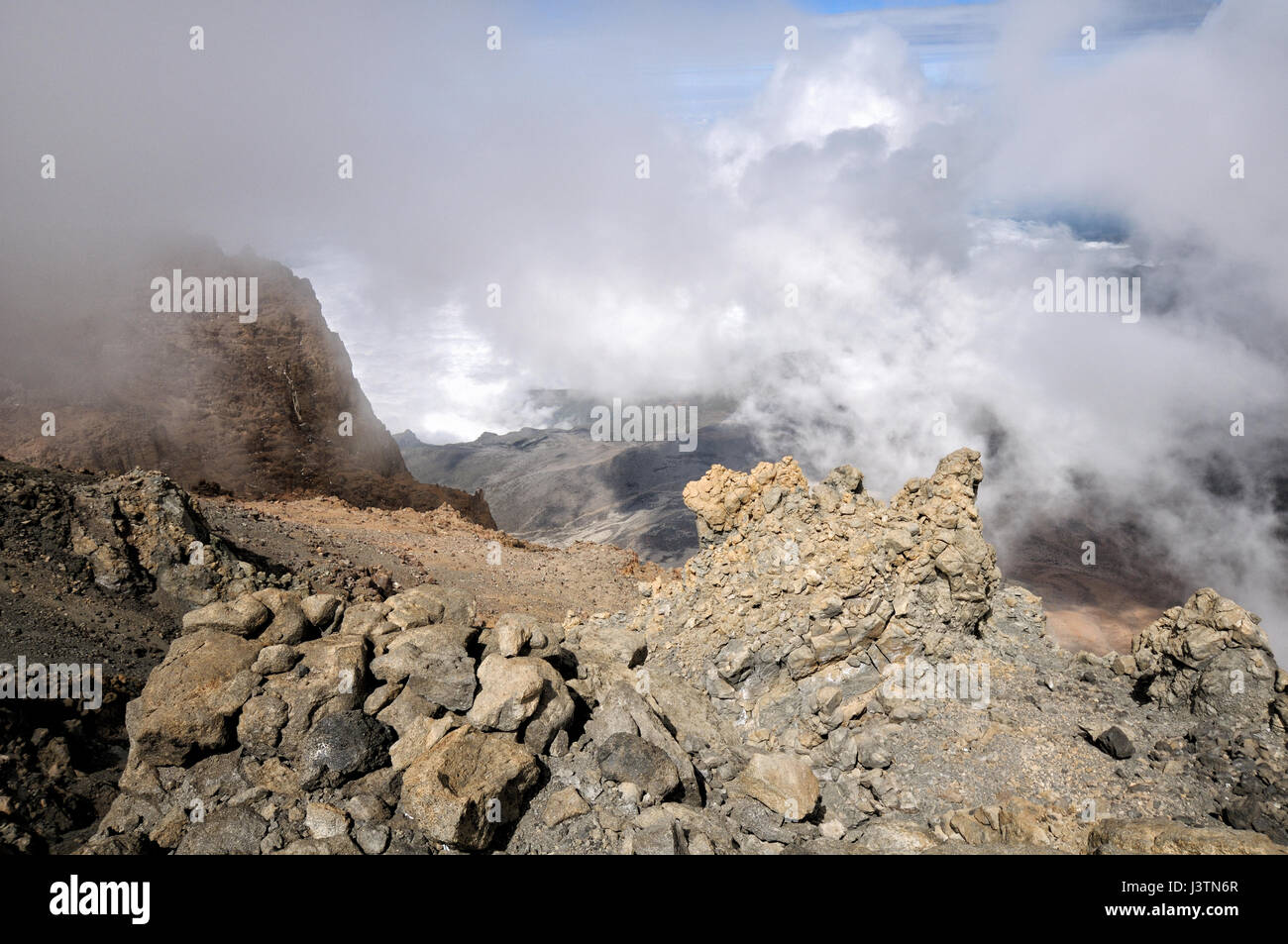 Clouds and rocks at the top of the Western Breach, Kilimanjaro National ...
