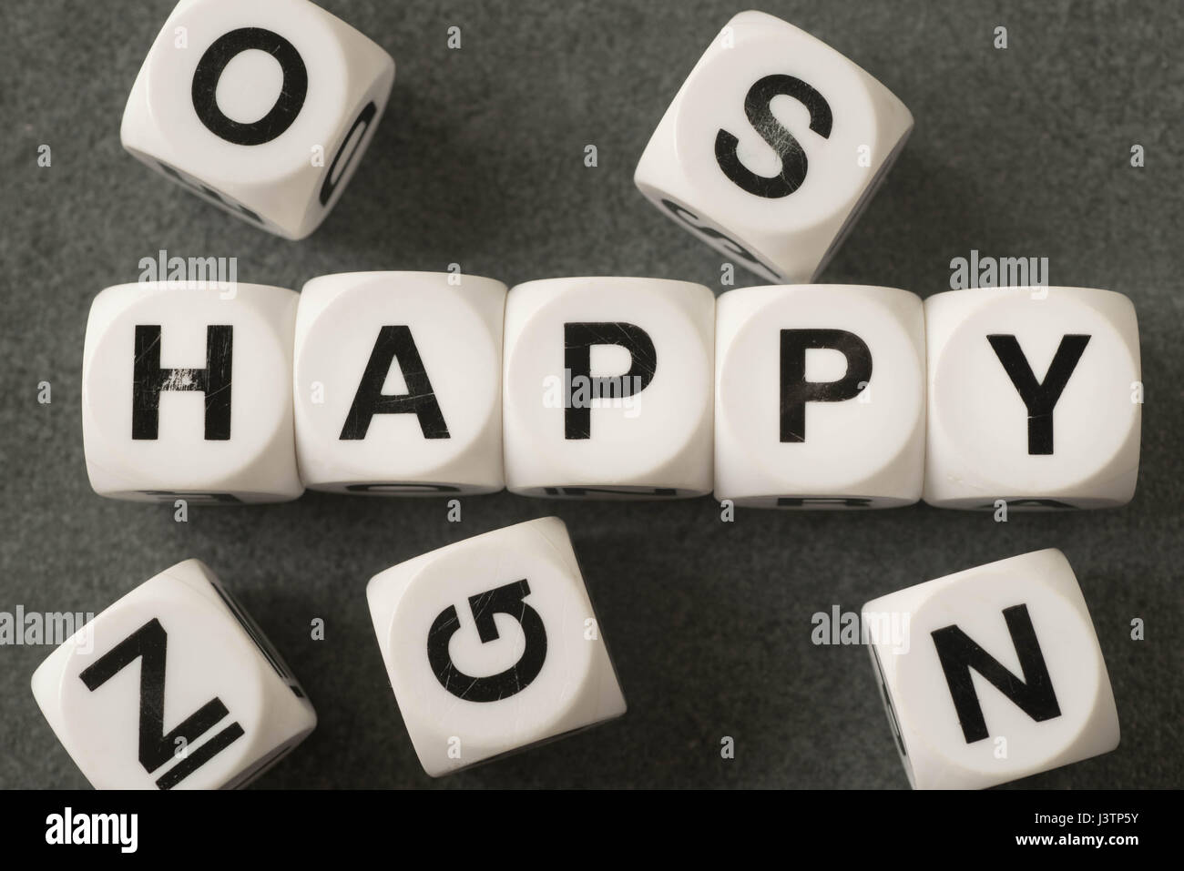word happy on white toy cubes Stock Photo - Alamy