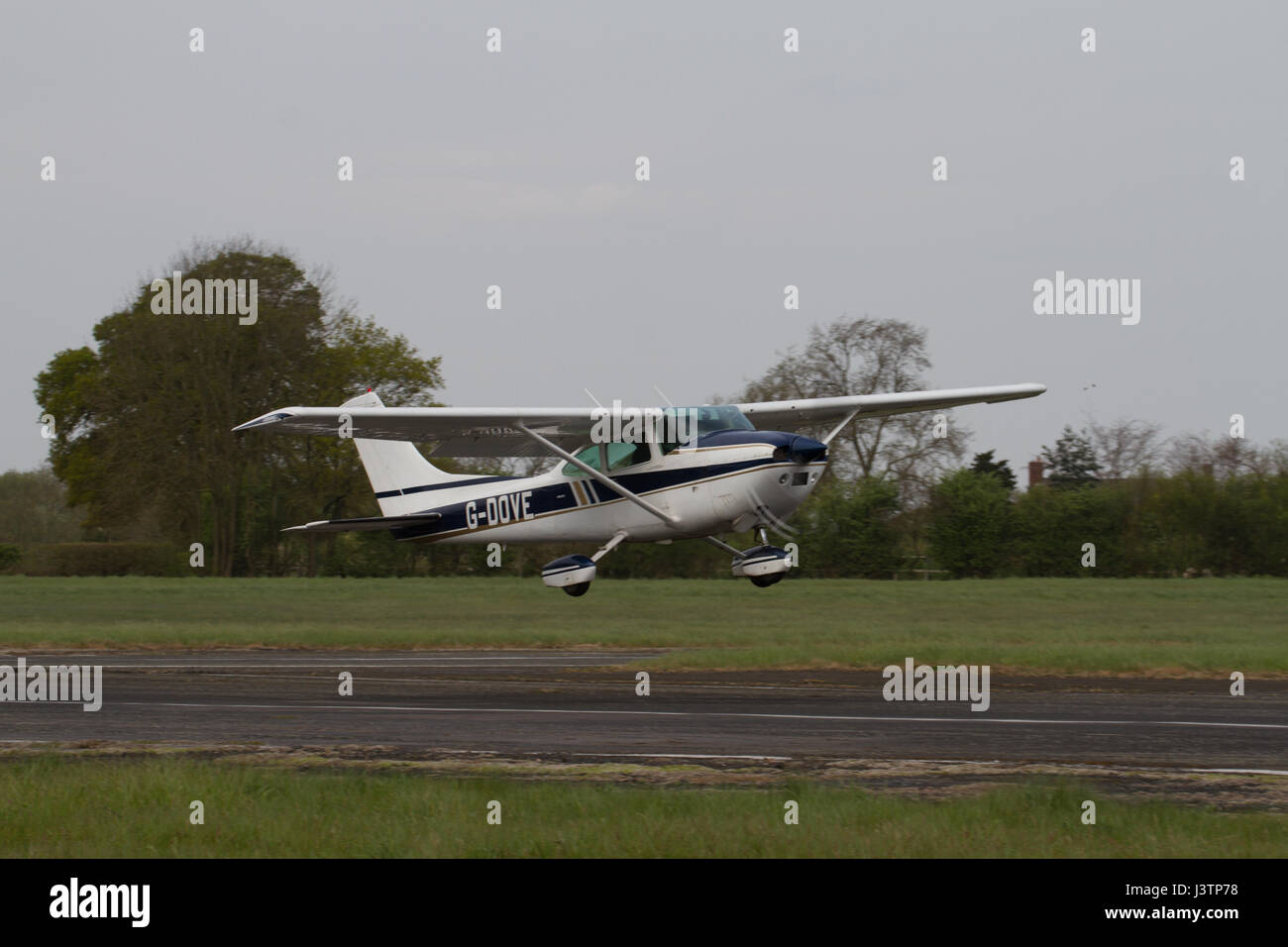 Single engined light aircraft taking off from at Wolverhampton ...