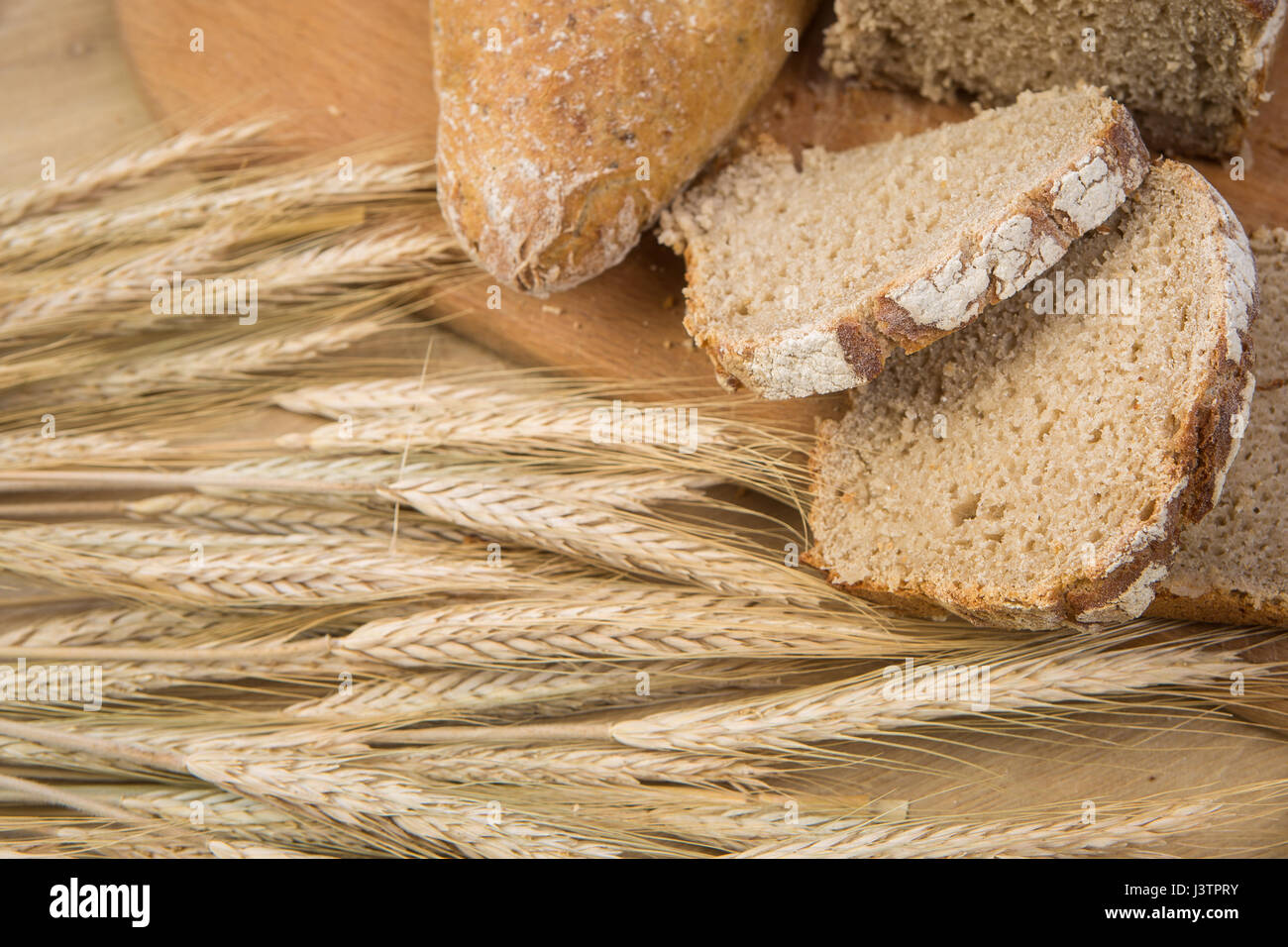 Fresh bread with a grain of corn Stock Photo - Alamy