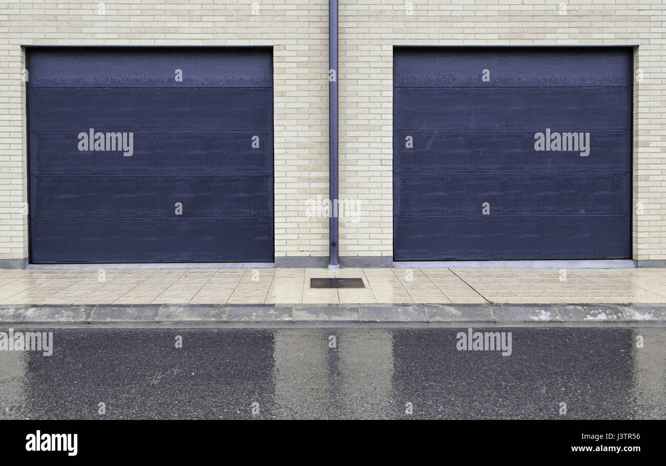 Garage doors, detail of doors in a house, parking for cars, protection ...