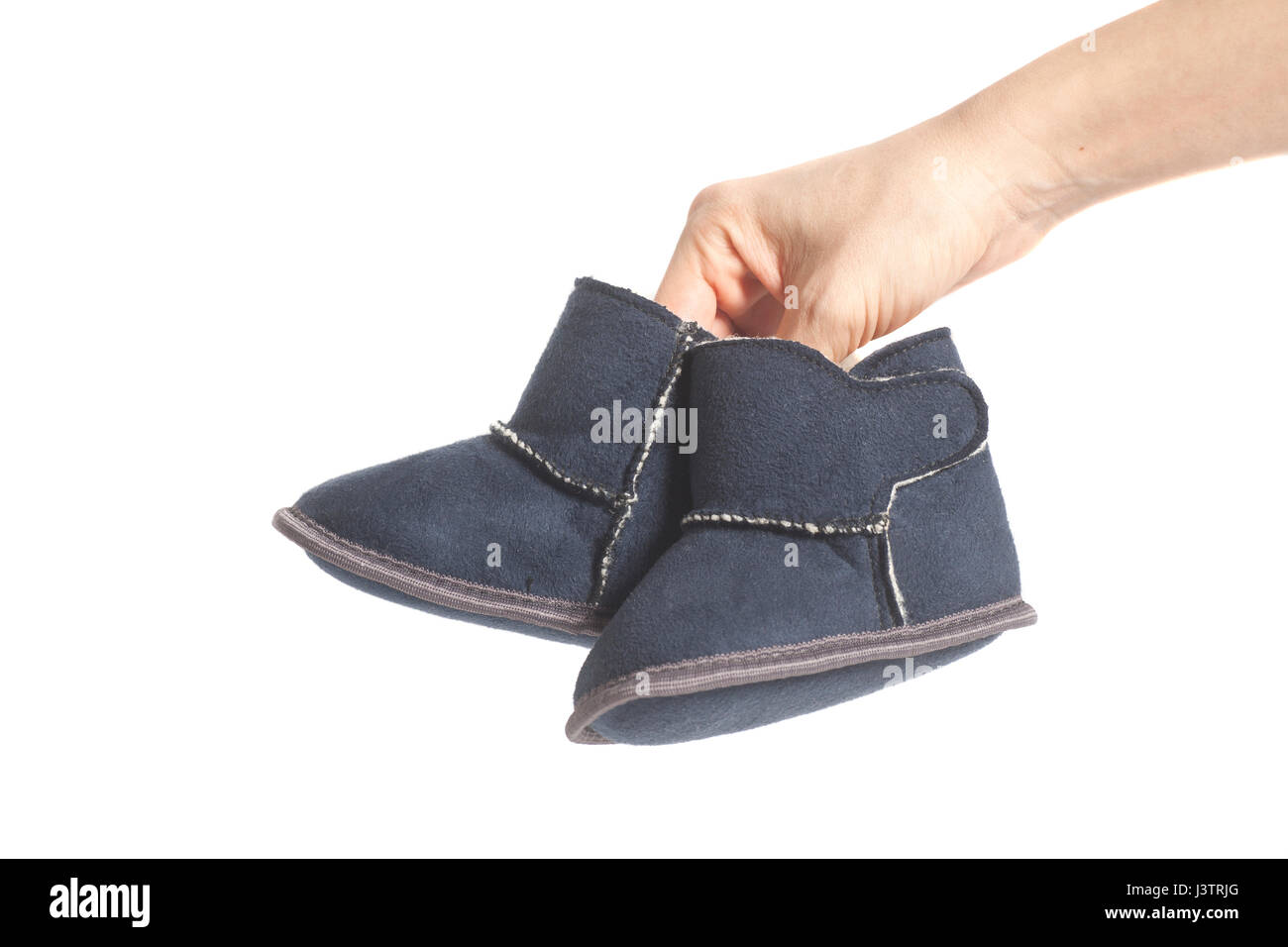 children winter boots on hands isolated on white background Stock Photo ...