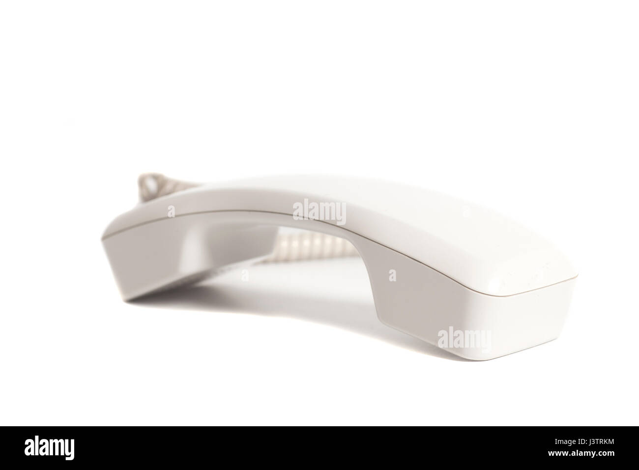 White telephone handset isolated on white background Stock Photo - Alamy
