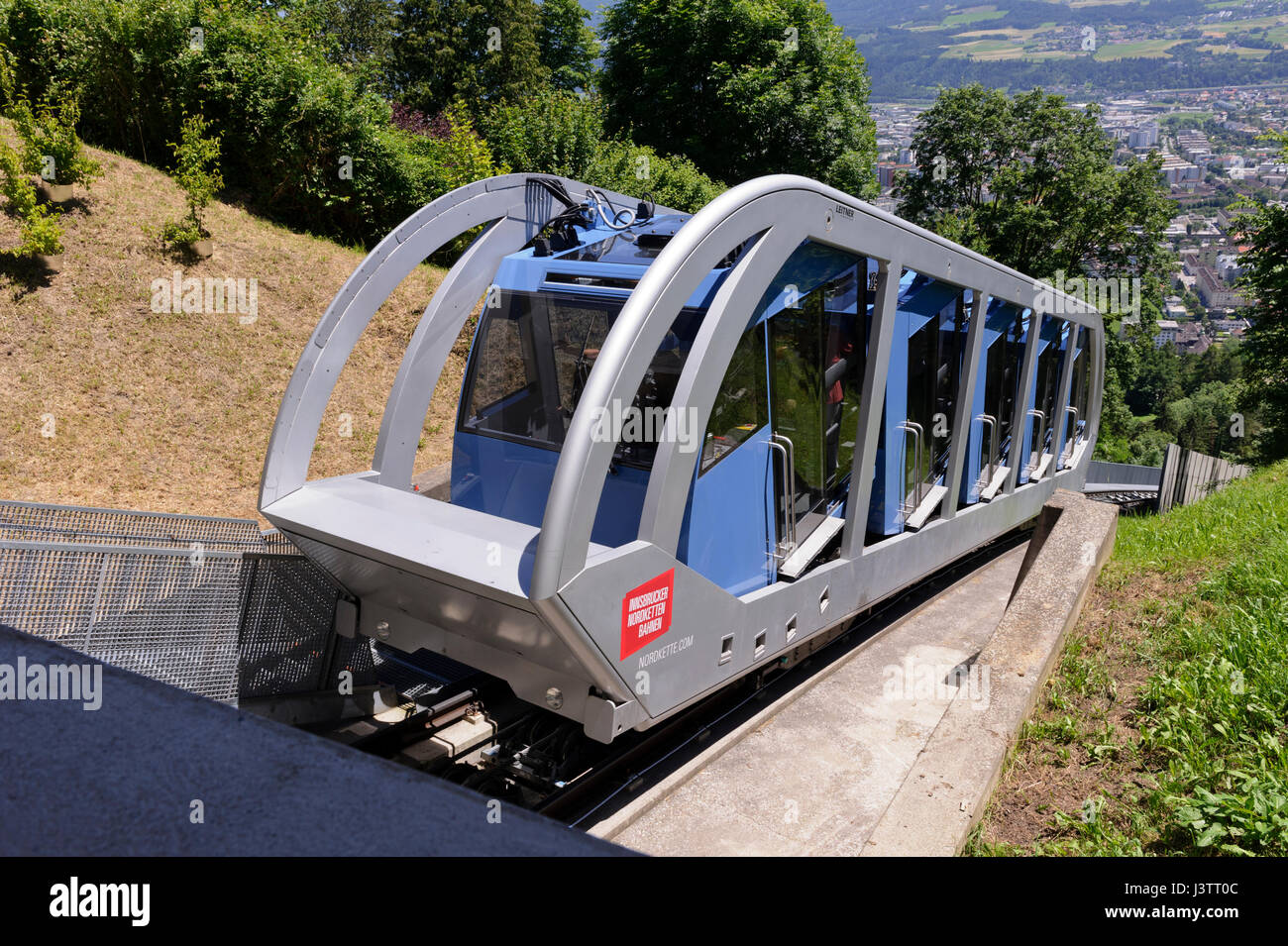 A funicular train approaching the Hungerburg Funicular Station ...