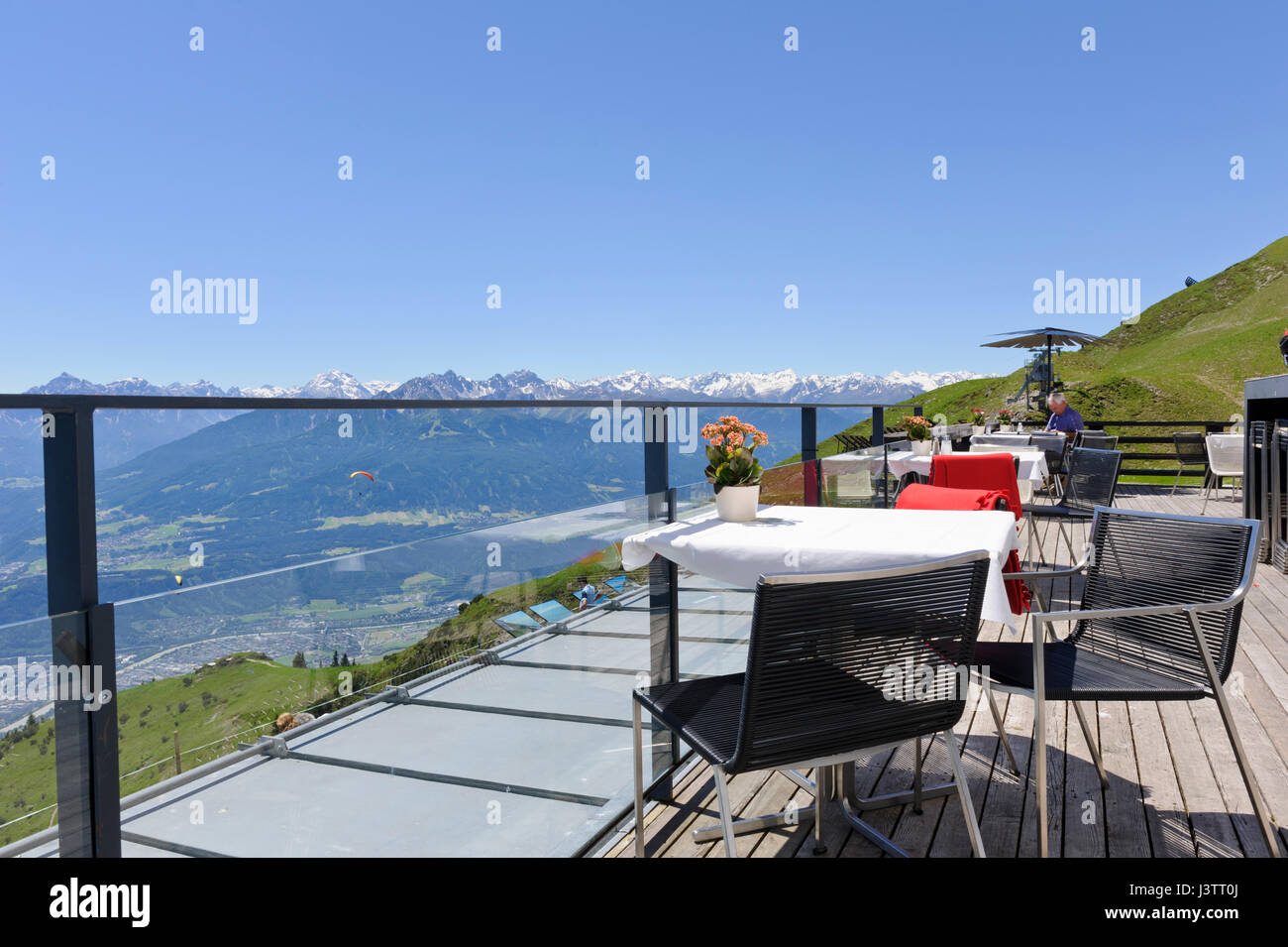 Tables and chairs at the Seegrube Cable Car Station restaurant ...
