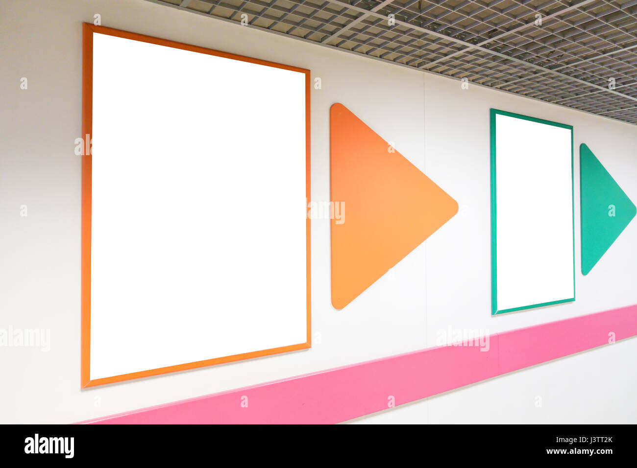 Mock up blank advertising poster frame with colorful frames hanging on ...