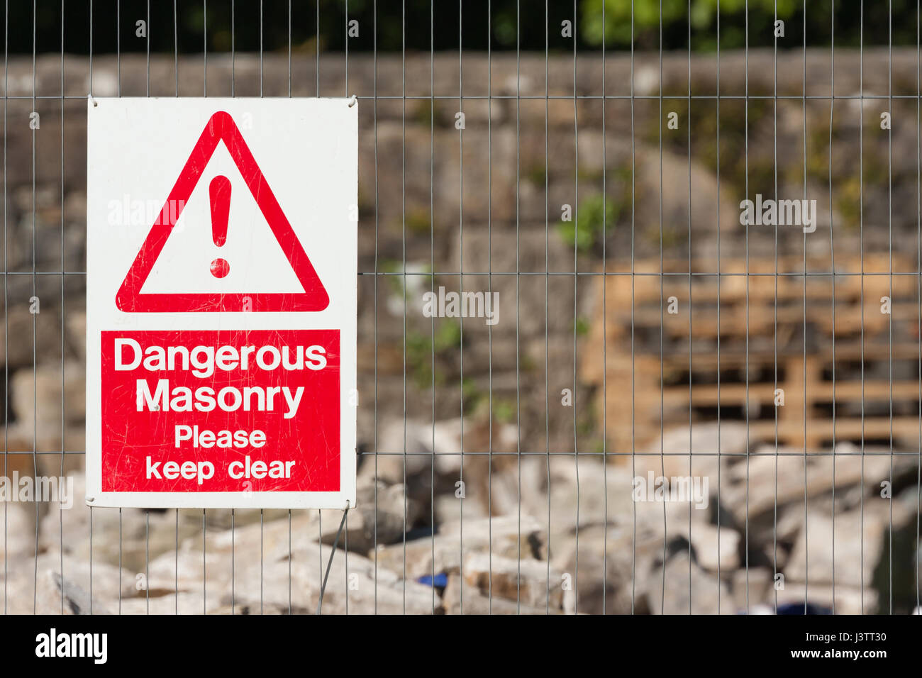 dangerous masonry sign Stock Photo - Alamy