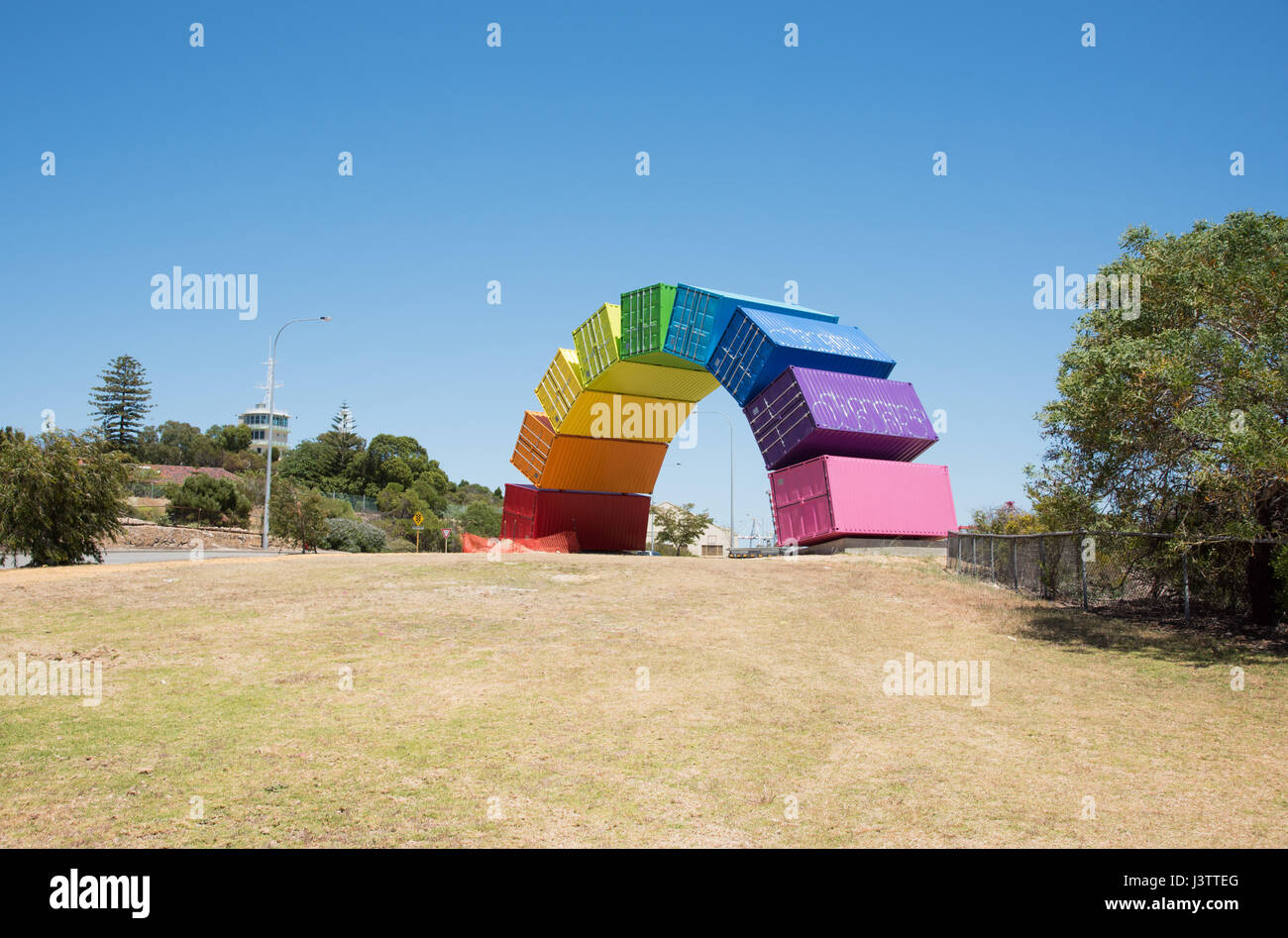 Eye-catching rainbow sea container sculpture by Marcus Canning on Beach ...