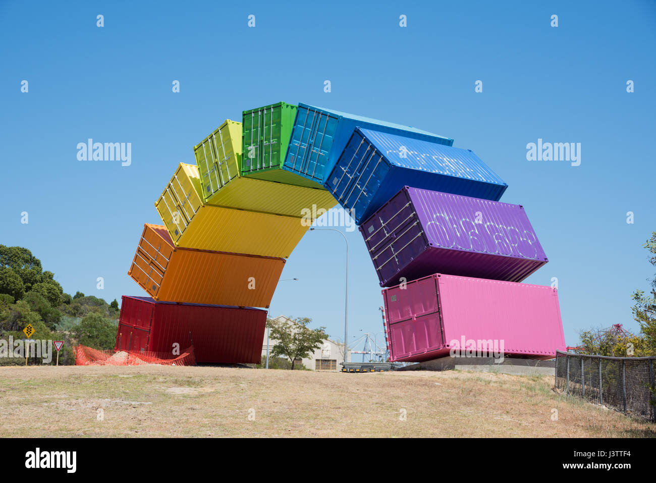 Eye-catching rainbow sea container sculpture by Marcus Canning on Beach ...
