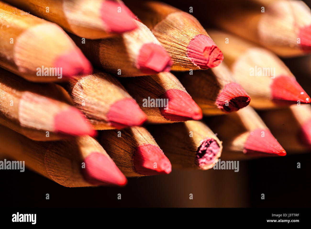 colour pencils stacked in horizontal position Stock Photo - Alamy
