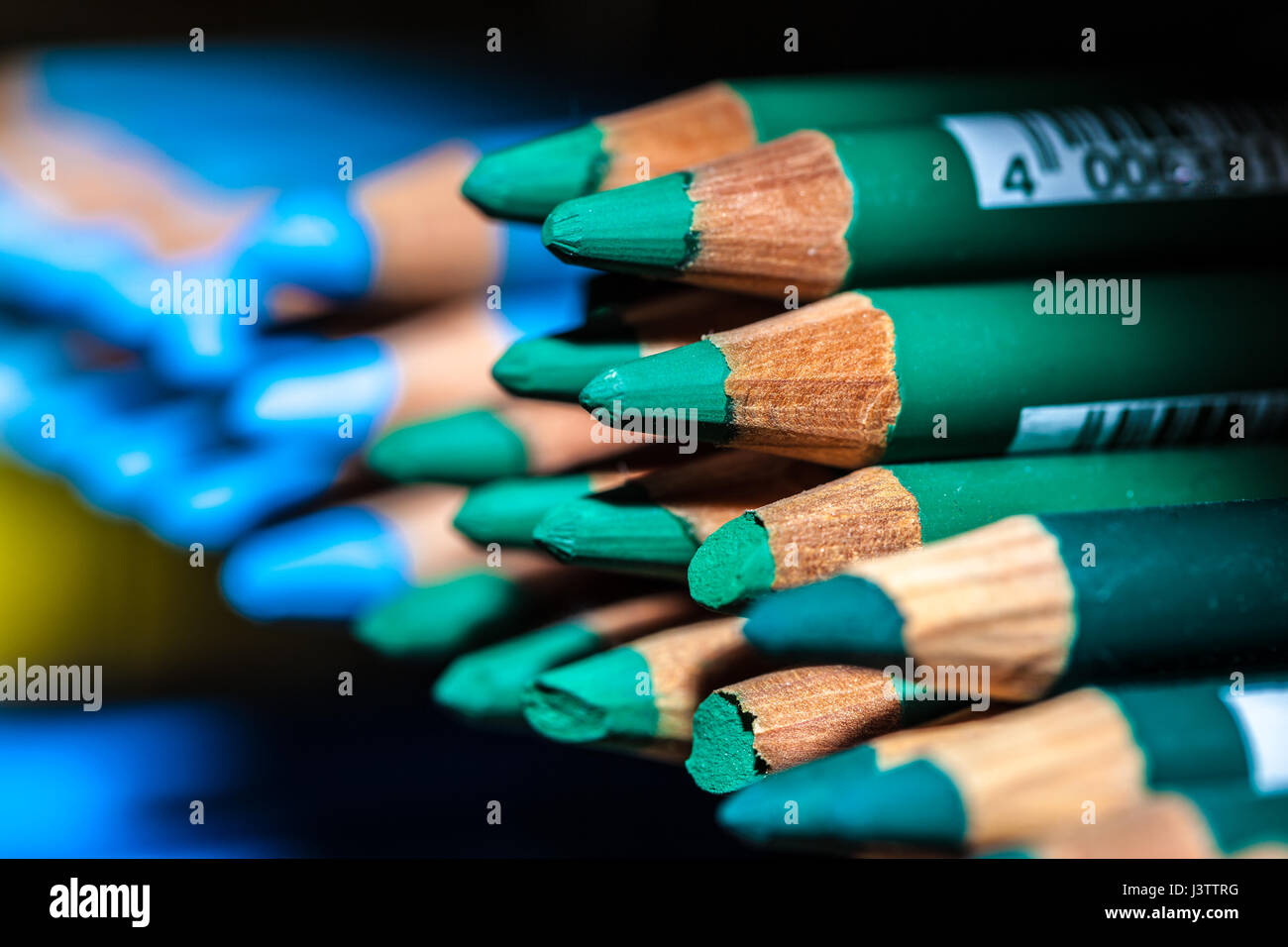 colour pencils stacked in horizontal position Stock Photo - Alamy