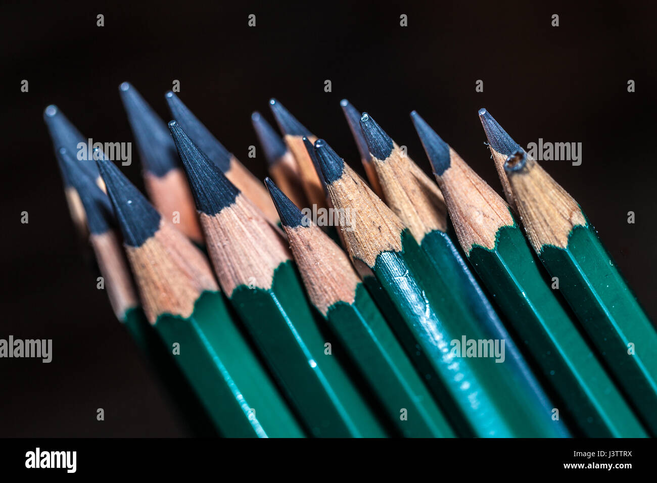 colour pencils stacked in vertical position Stock Photo - Alamy