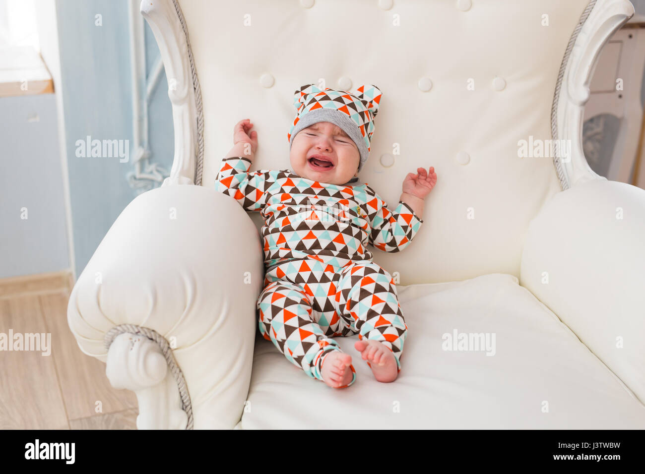 Portrait of crying baby boy Stock Photo - Alamy