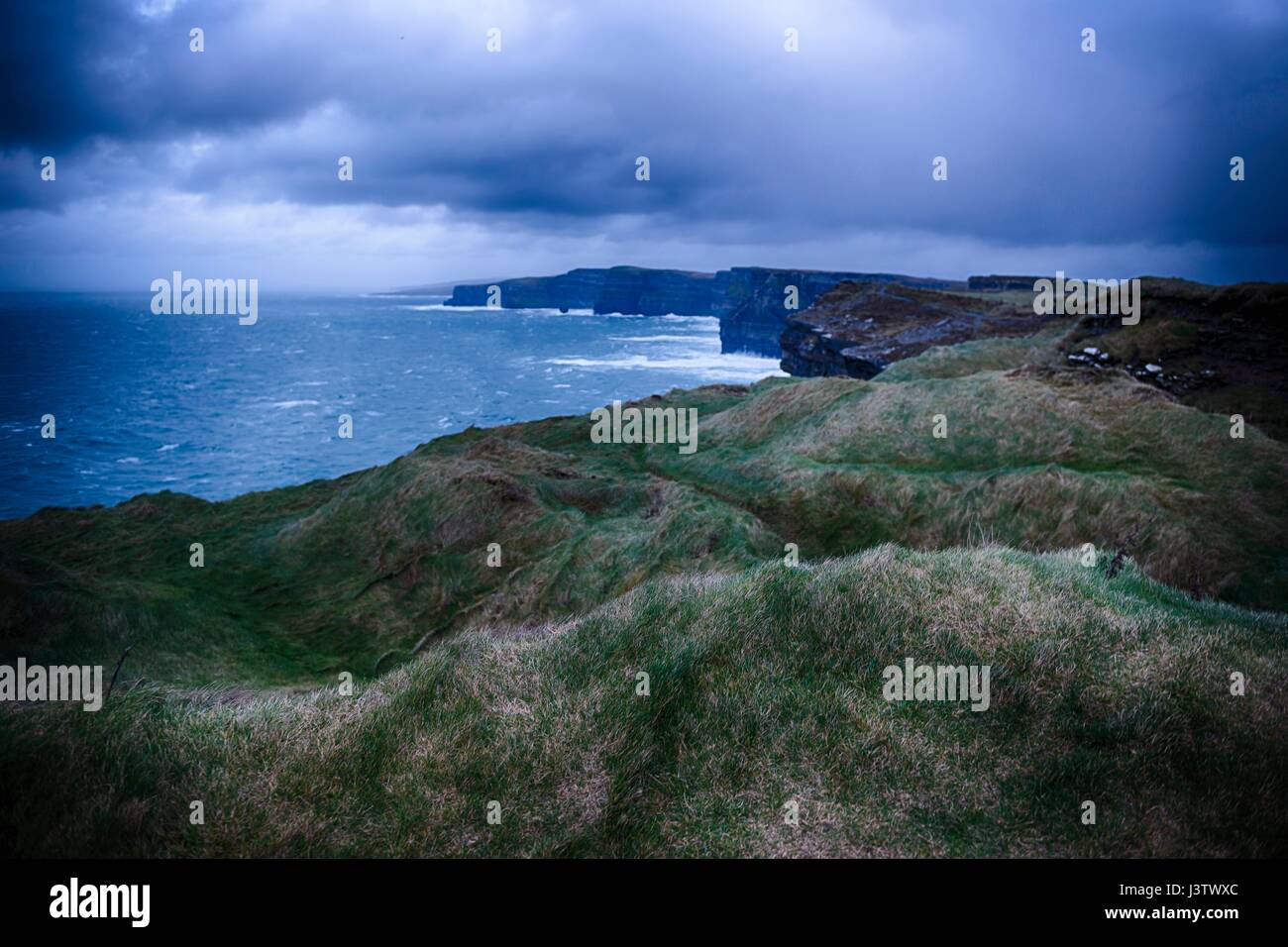 Picture taken on Cliffs of Moher in Ireland during the storm. The wind ...