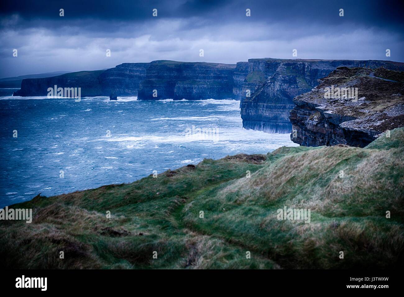 Picture taken on Cliffs of Moher in Ireland during the storm. The wind ...