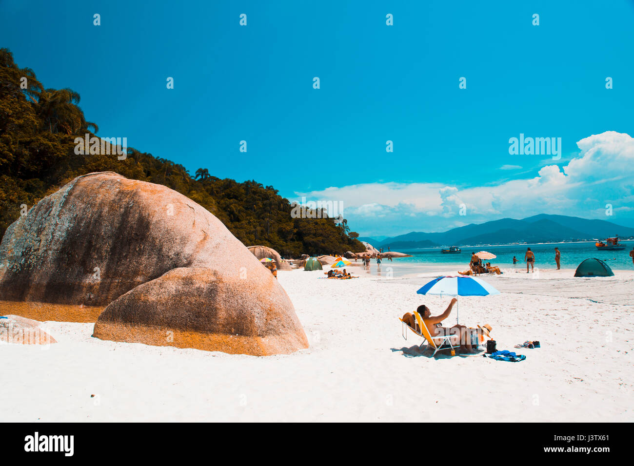 sunbathing tourist at the beach of ilha do campeche, Florianópolis - SC ...