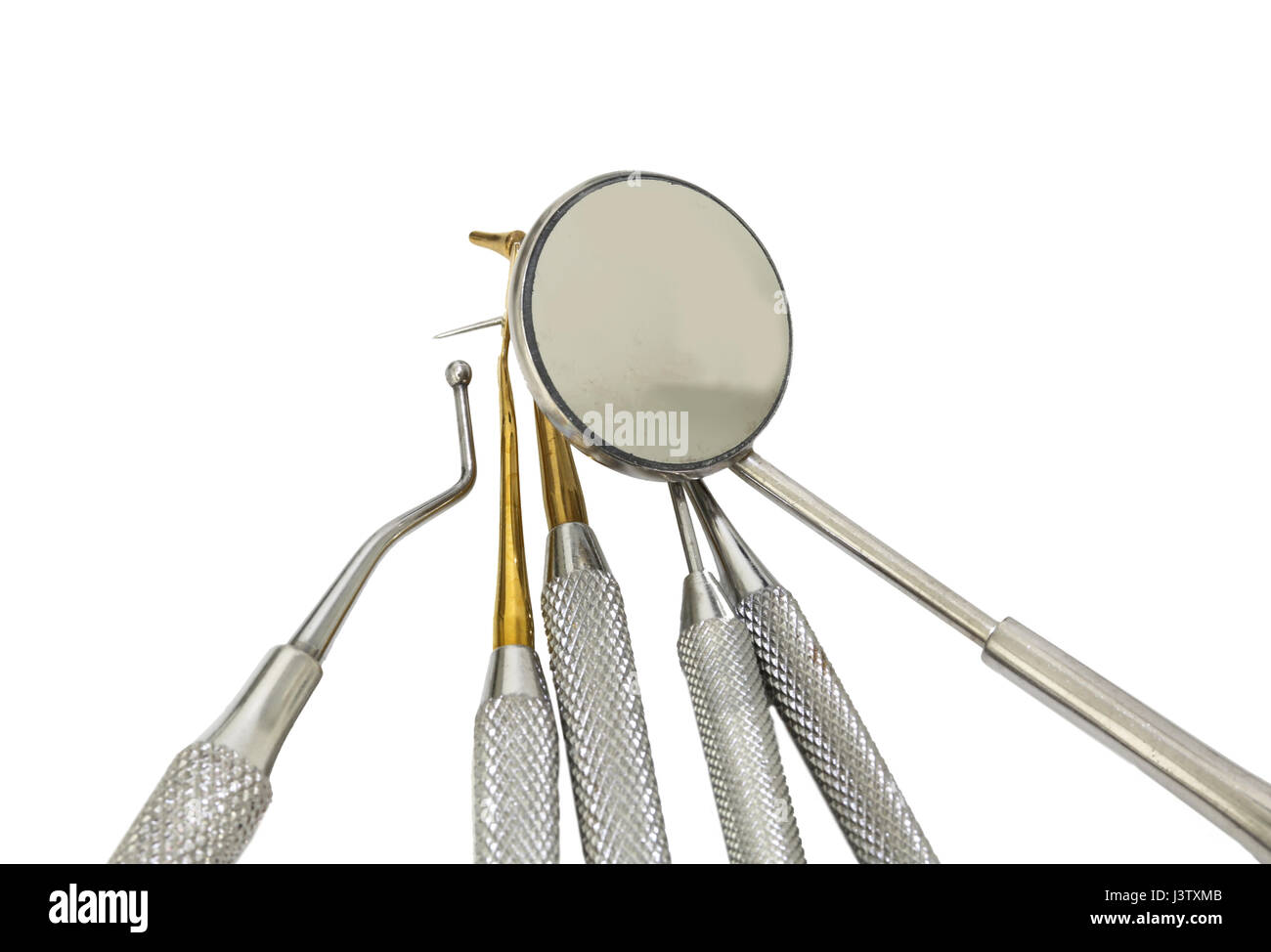 Many dental tools for cleaning the teeth and checking the caries with ...