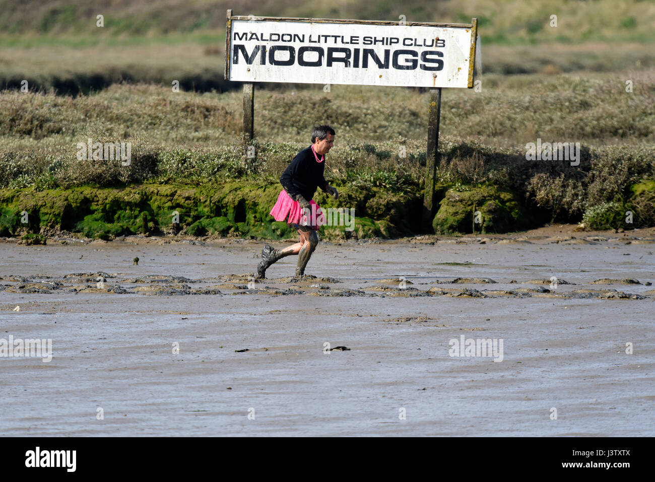 Mad Maldon Mud Race competitor covered in mud from racing through and ...