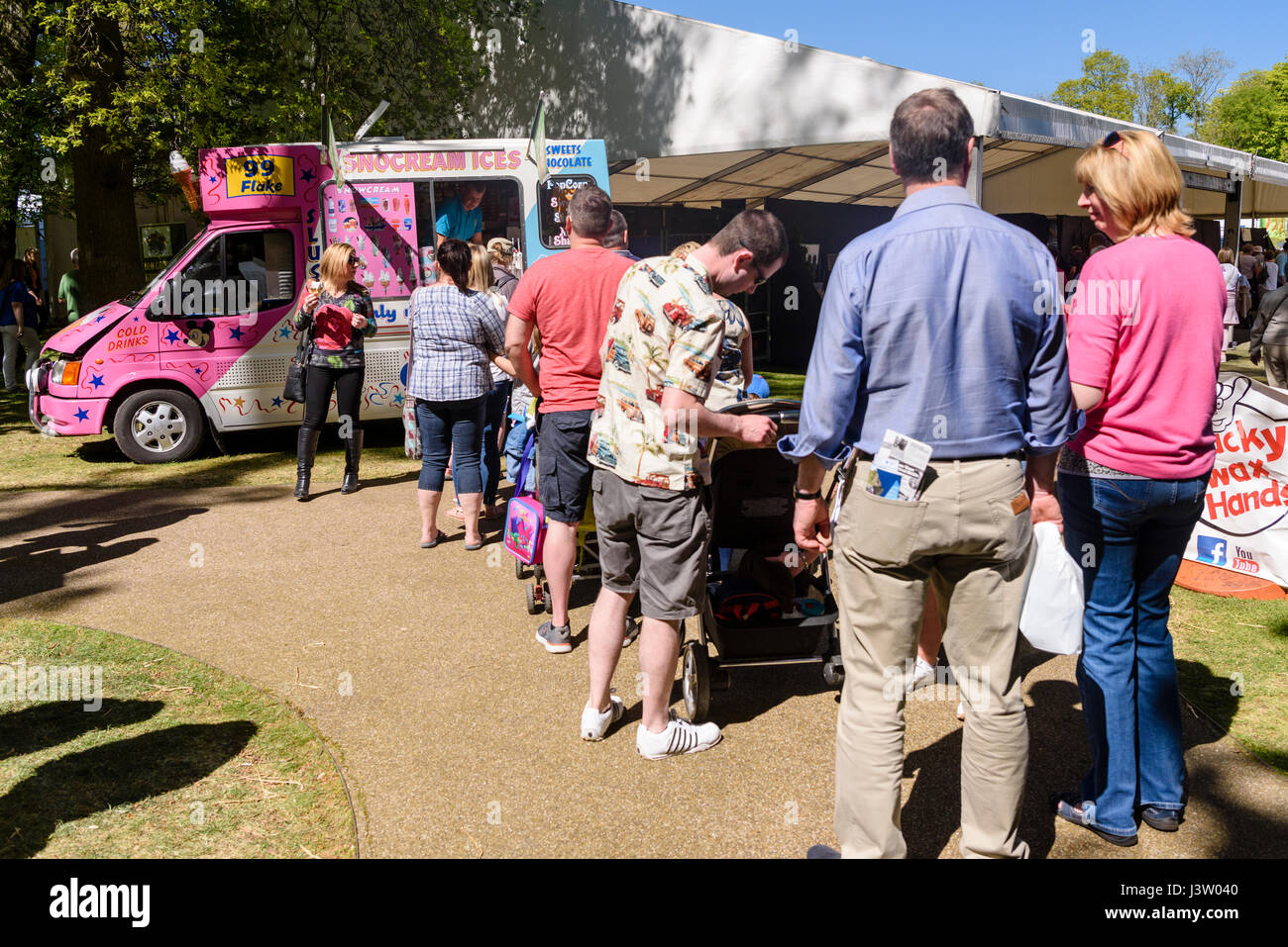 People queue up at an ice-cream van during a sunny day Stock Photo - Alamy