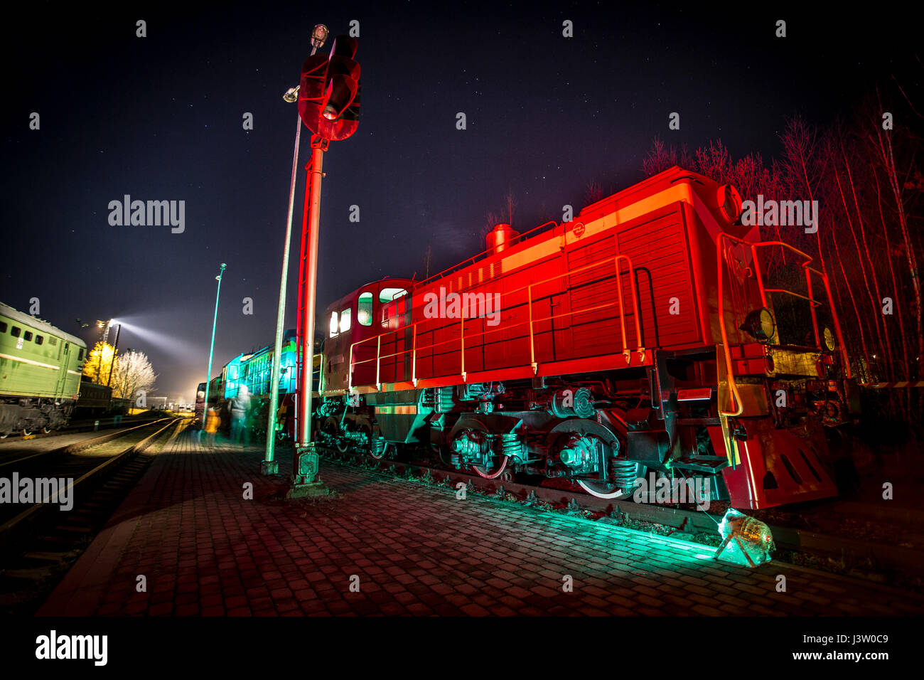 Soviet locomotive train colored at night Stock Photo - Alamy