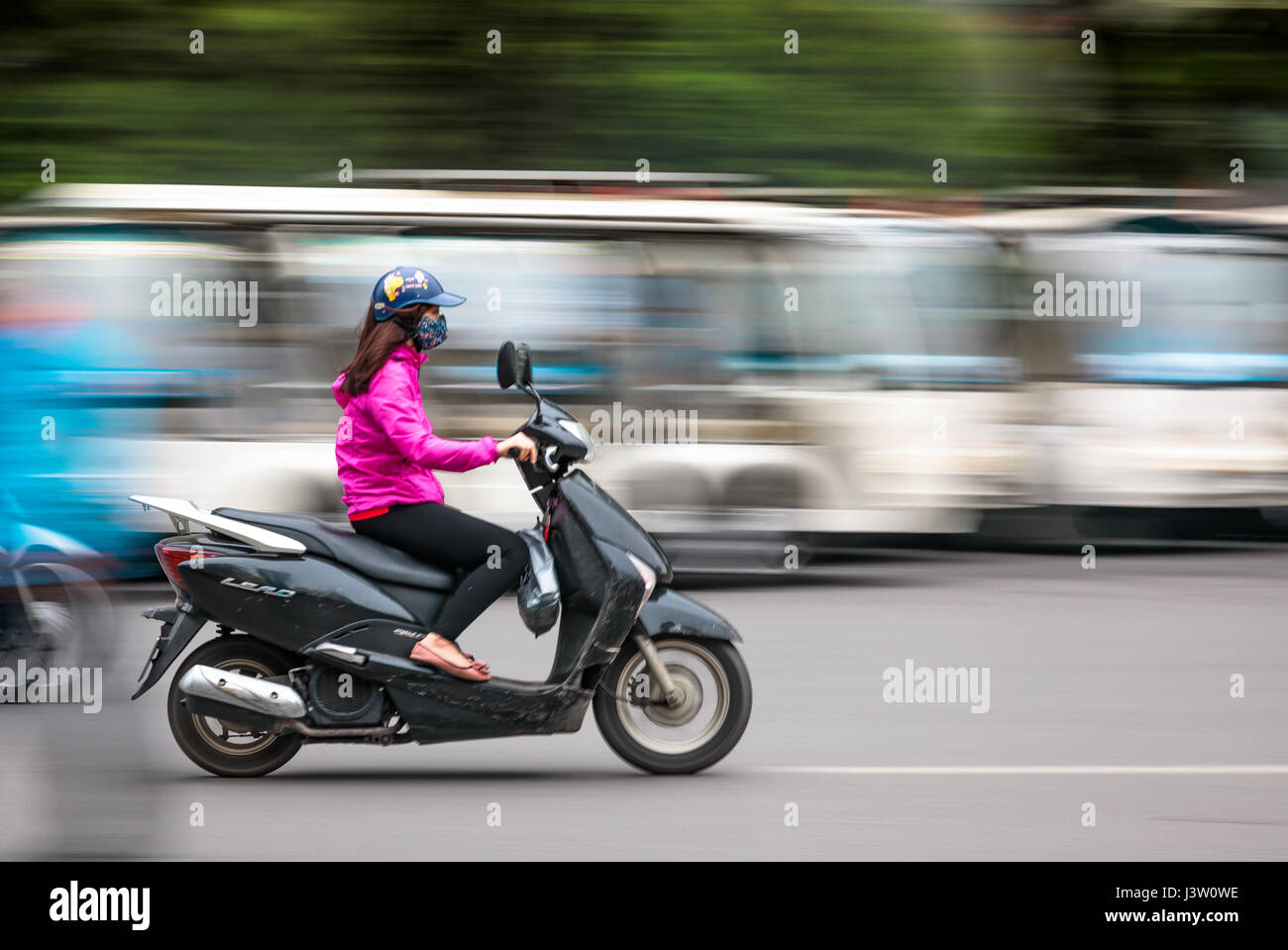 Moped worker hi-res stock photography and images - Alamy