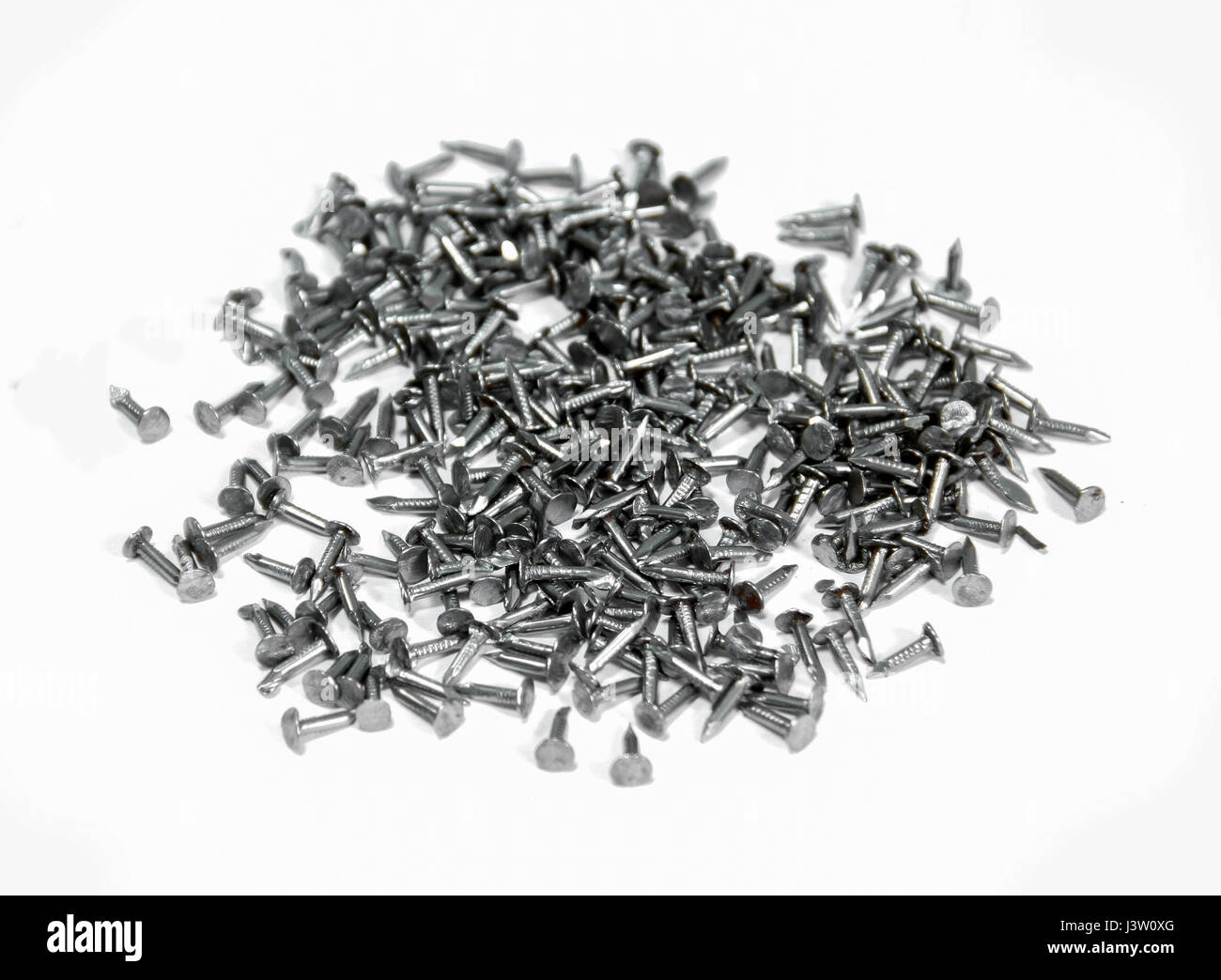 many small tack on white background Stock Photo - Alamy