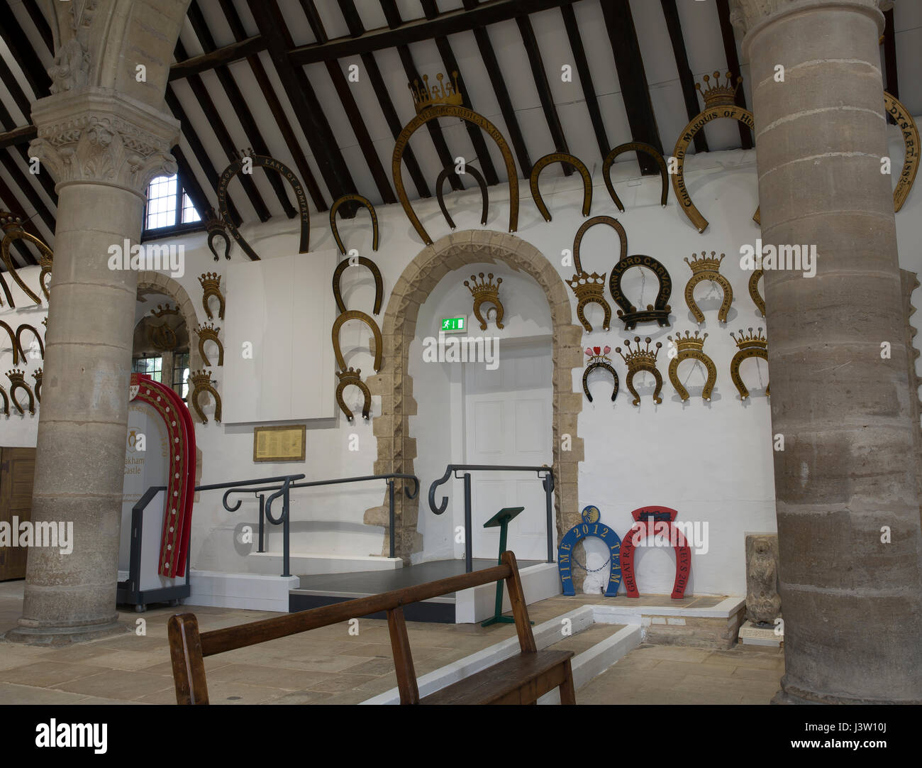 Horseshoes on the interior walls of Oakham Castle in Rutland which is ...