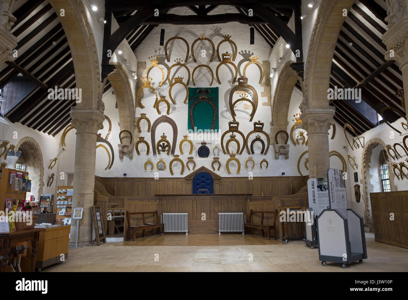 Horseshoes on the interior walls of Oakham Castle in Rutland which is ...