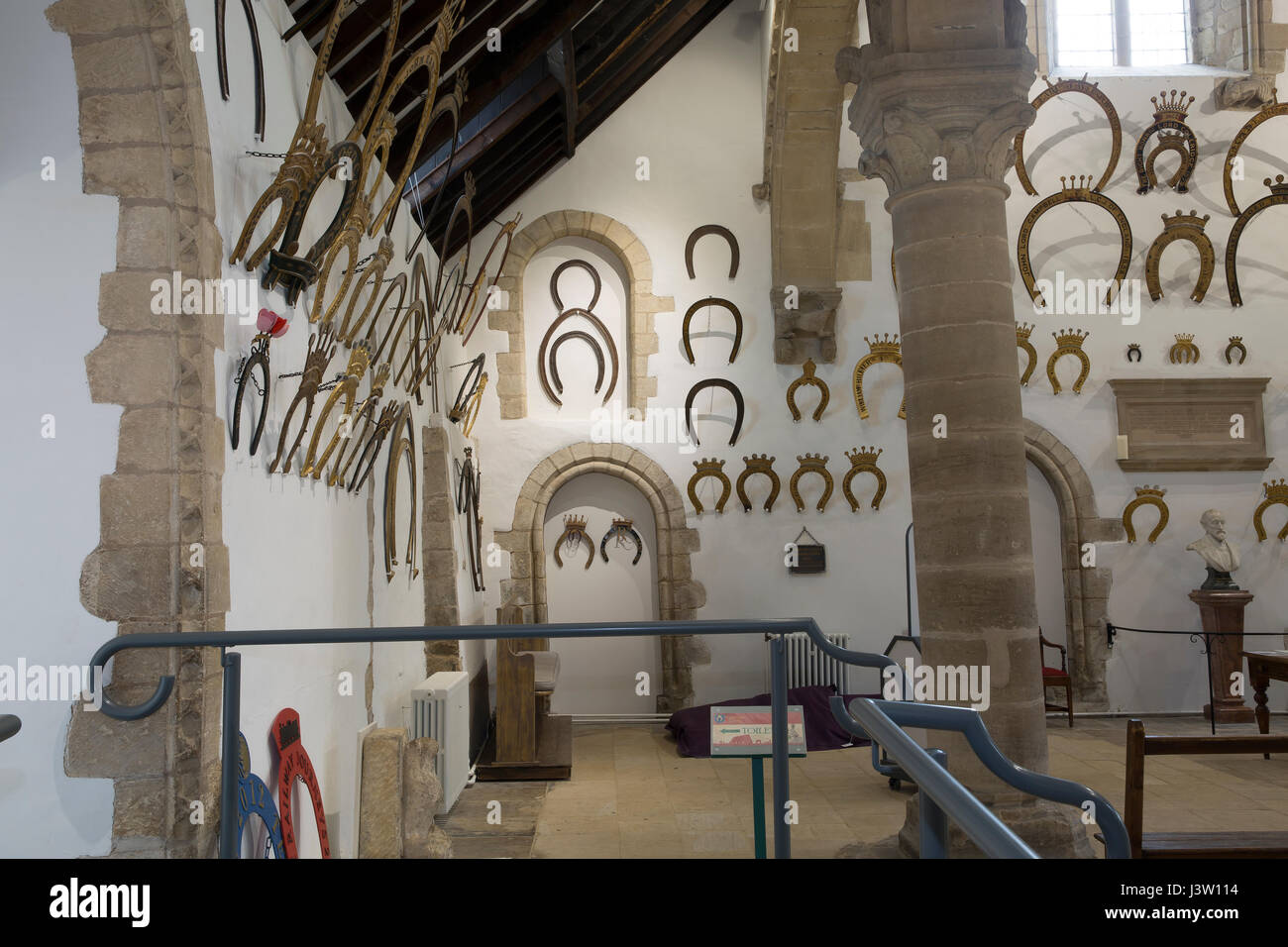Horseshoes on the interior walls of Oakham Castle in Rutland which is ...