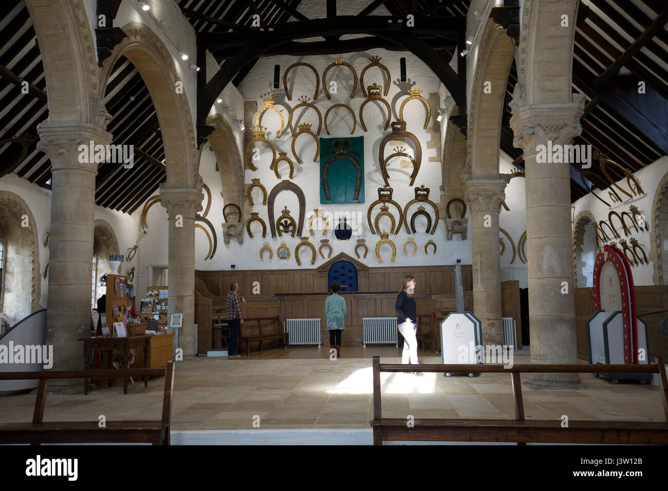Horseshoes on the interior walls of Oakham Castle in Rutland which is ...