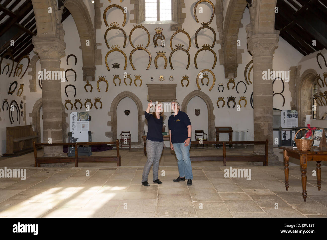 Horseshoes on the interior walls of Oakham Castle in Rutland which is ...