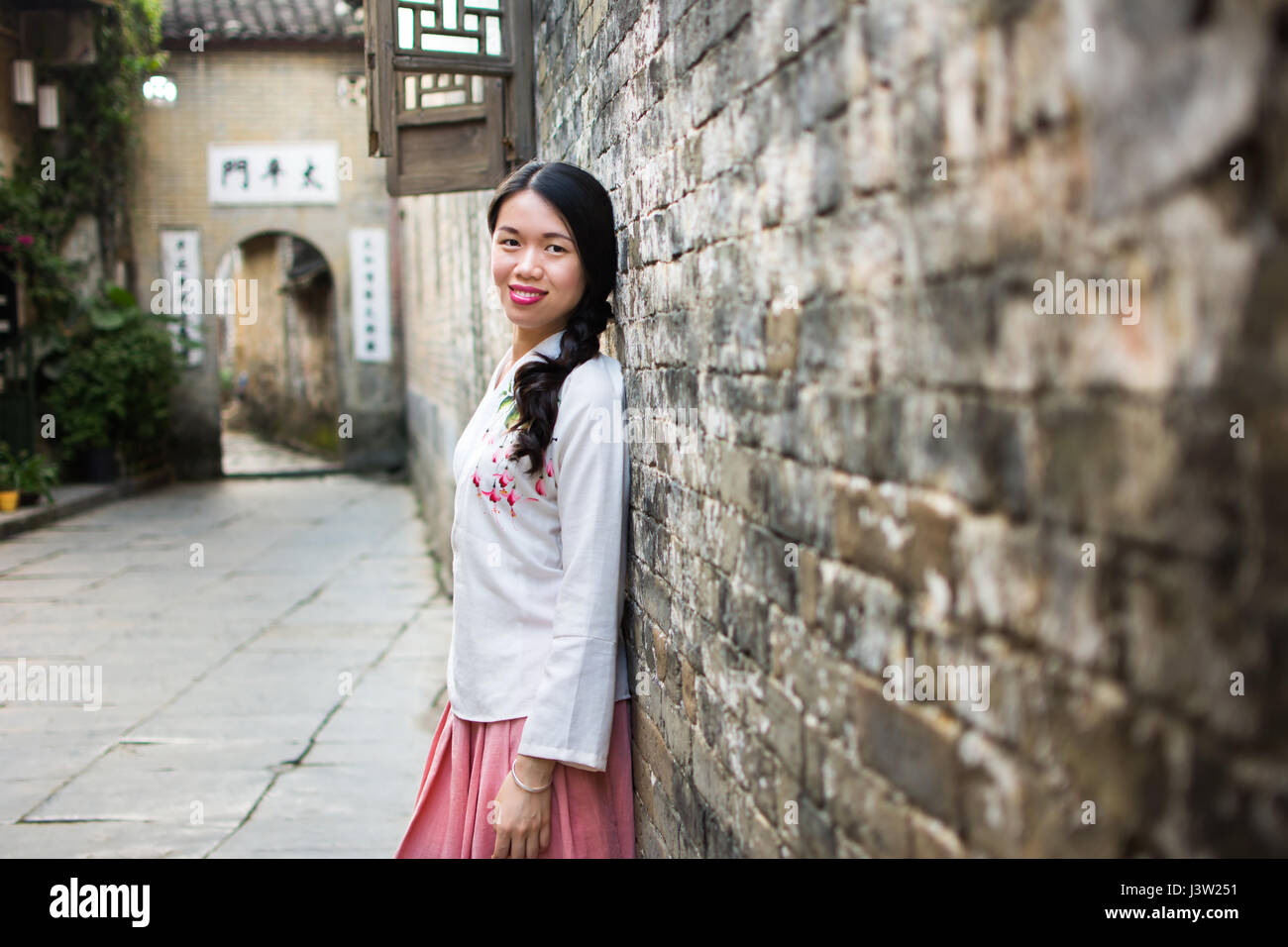 Girl wearing Han Chinese clothing in old town Stock Photo - Alamy