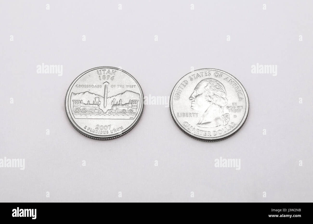 Closeup to Utah State Symbol on Quarter Dollar Coin on White Background ...