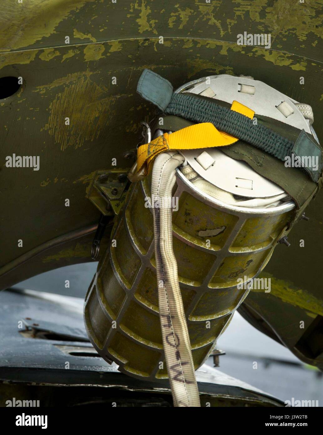 A pilot chute canister is loaded into a B-52H Stratofortress at RAF ...