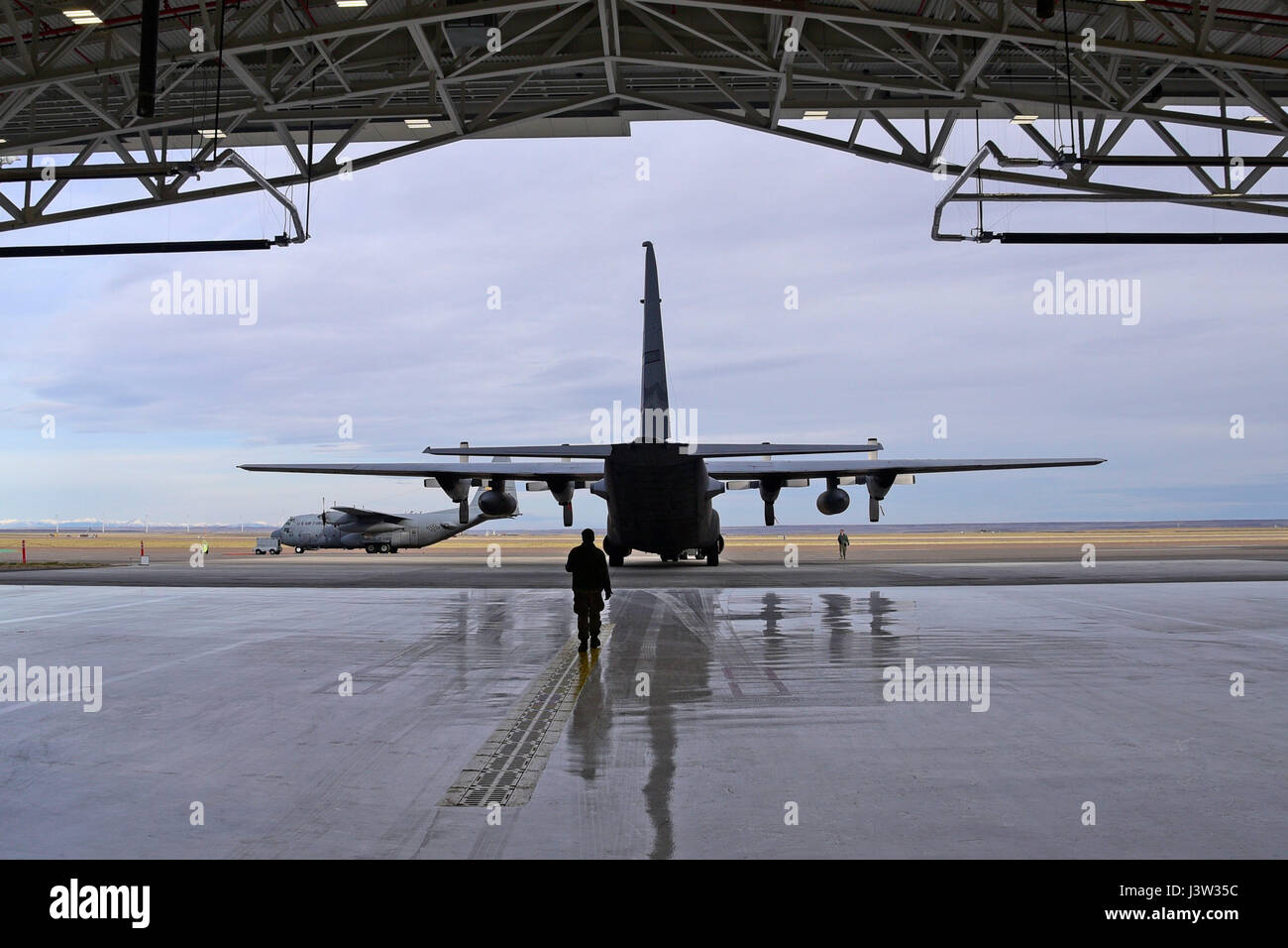 A C-130 Hercules aircraft is moved into Building 80 at the 120th Airlift Wing, Montana Air ...